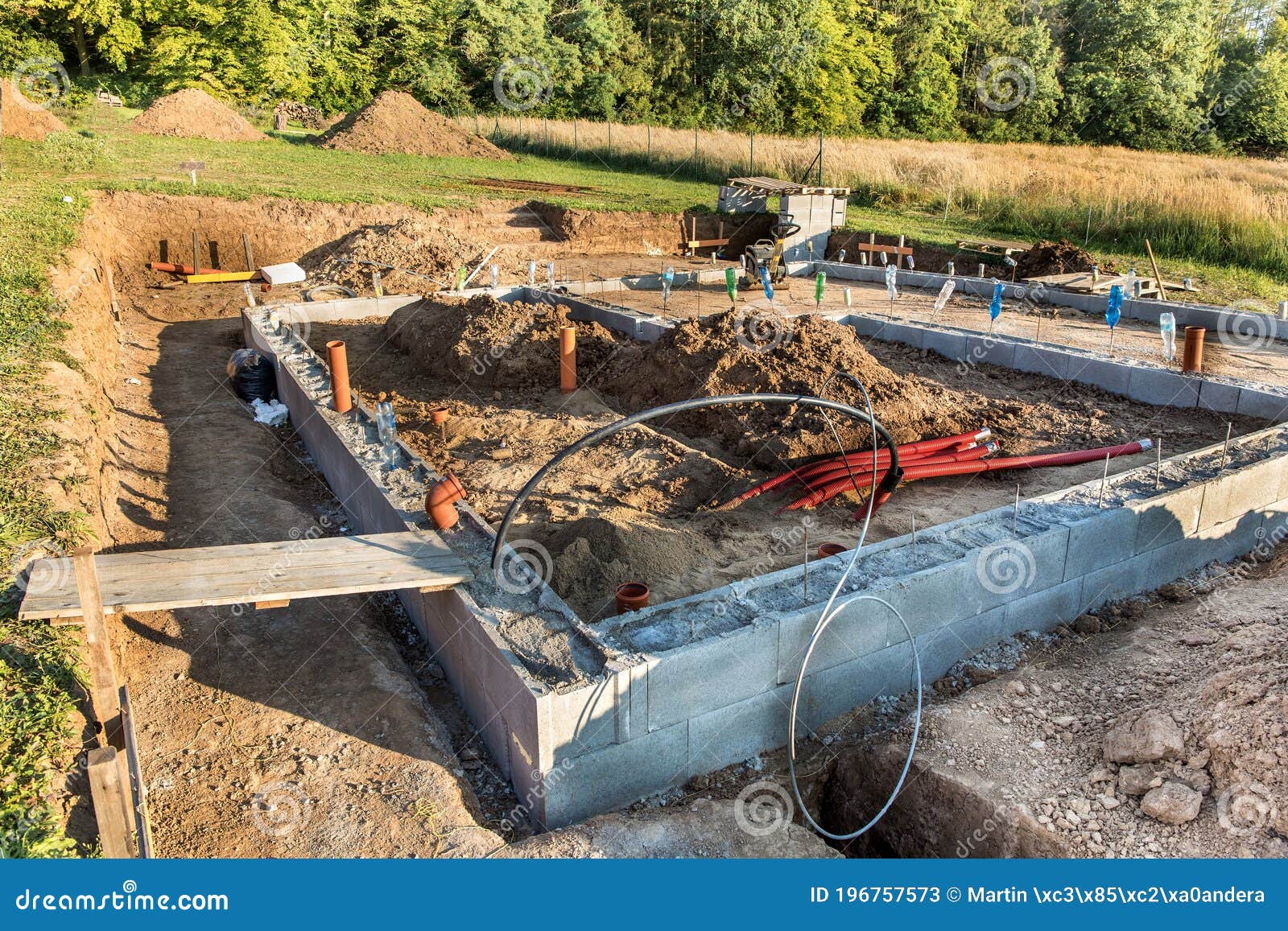 Family House Under Construction. Foundation of a Family House from Lost ...