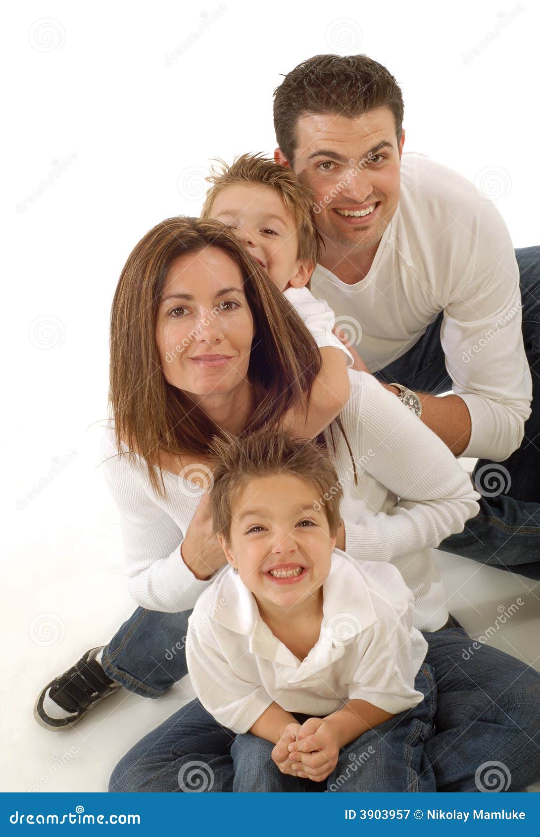 Family huddled together stock image. Image of kids, life - 3903957