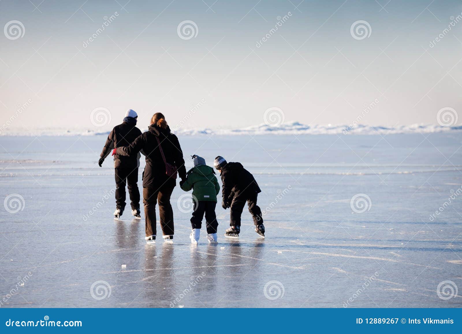 Family ice skating stock image. Image of outdoors, leisure - 12889267