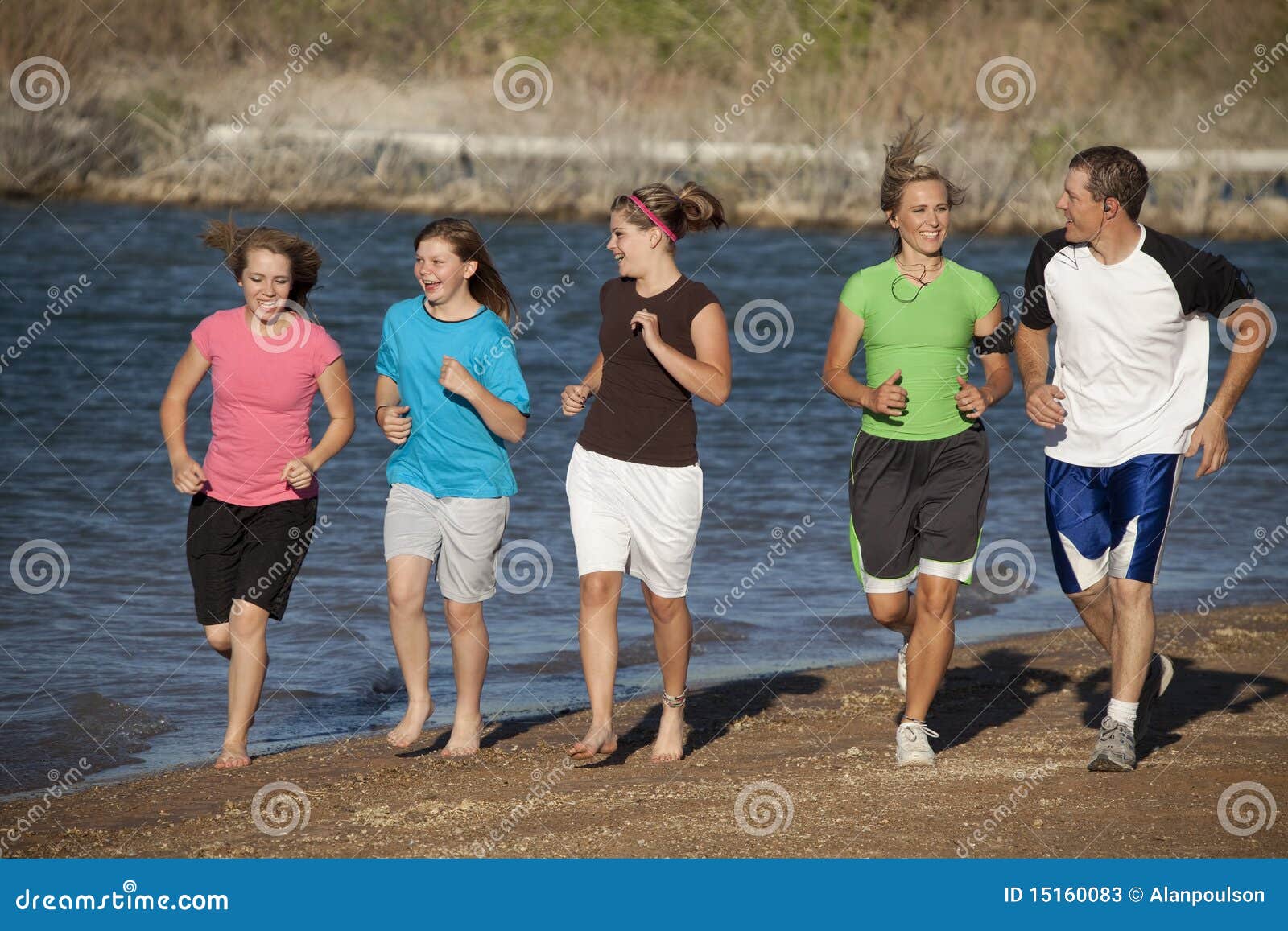 Family jogging together stock image. Image of father - 15160083