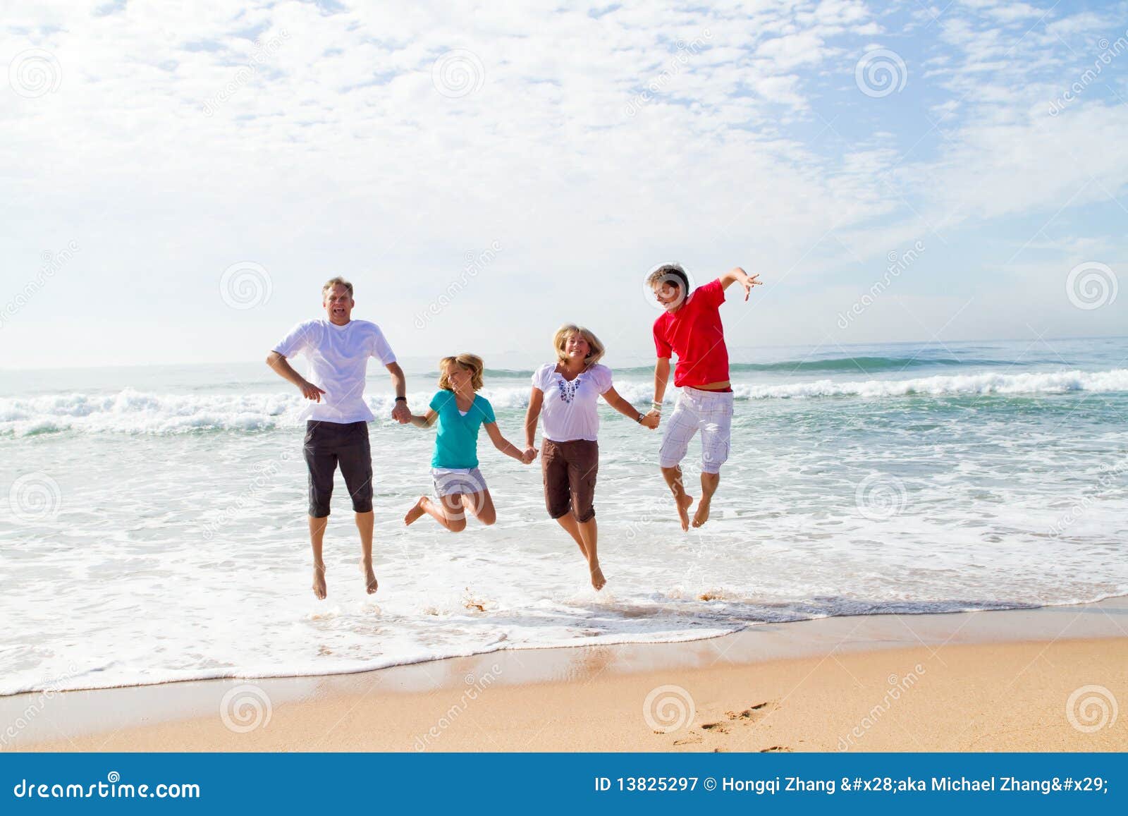 Family jumping on beach stock image. Image of father - 13825297
