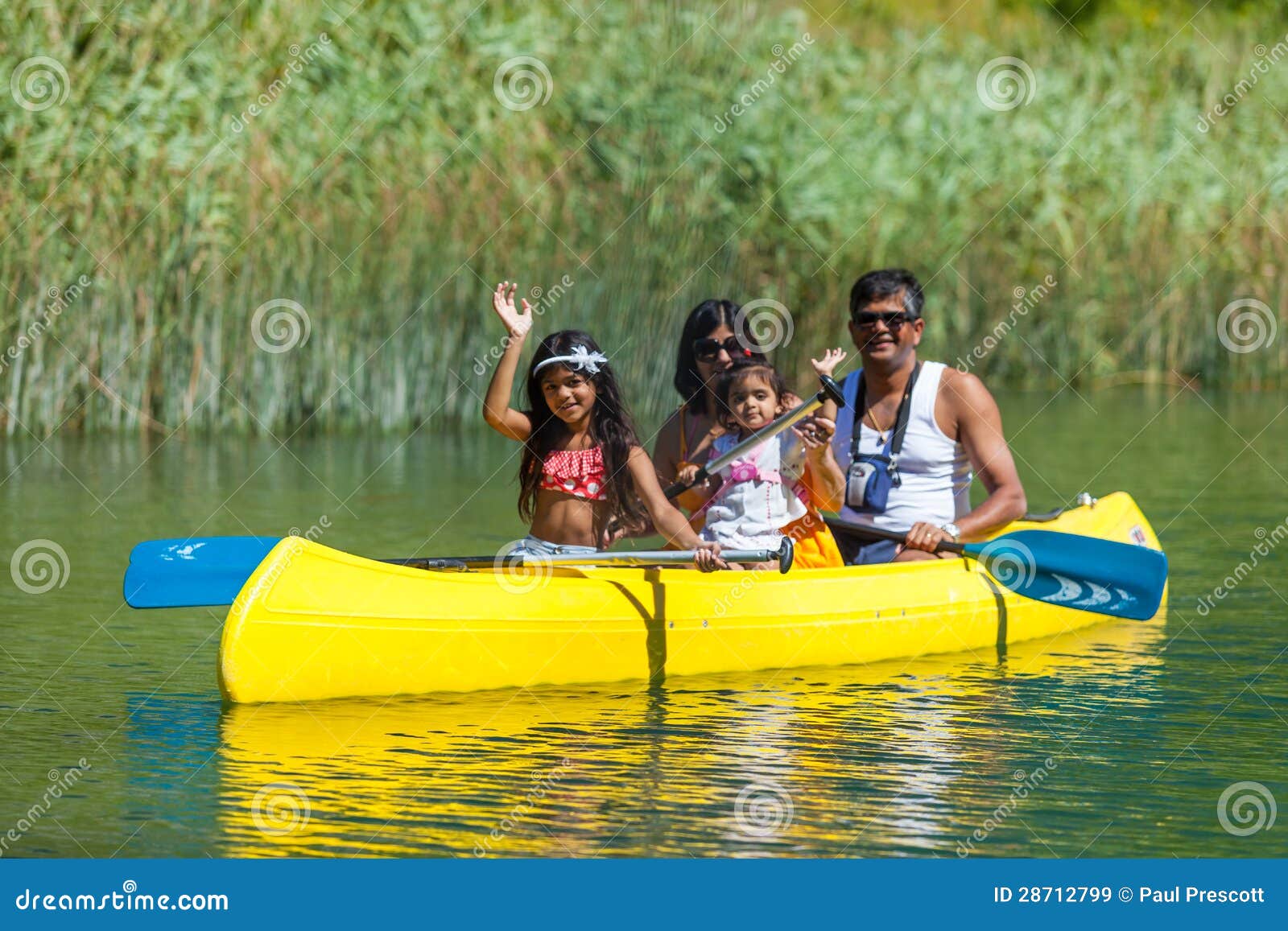 Family in kayak editorial stock image. Image of family - 28712799
