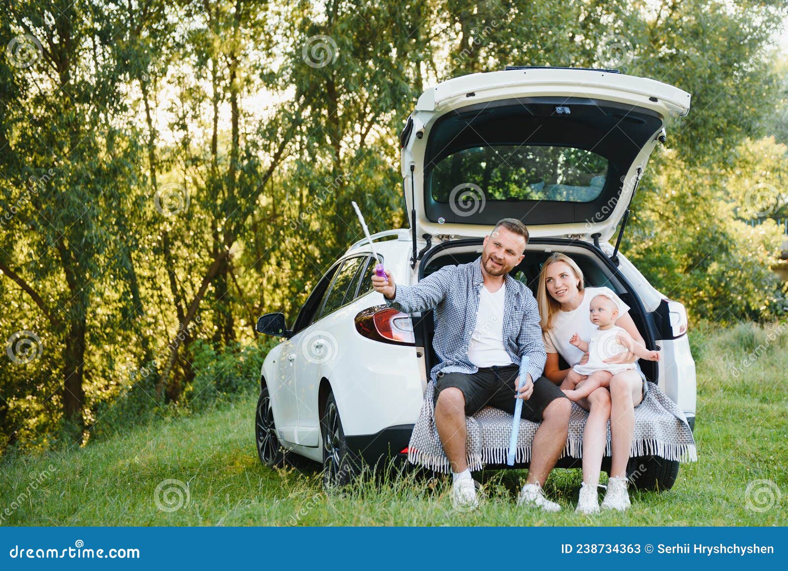Family with Kid Sitting in Car Trunk Stock Image - Image of baby ...