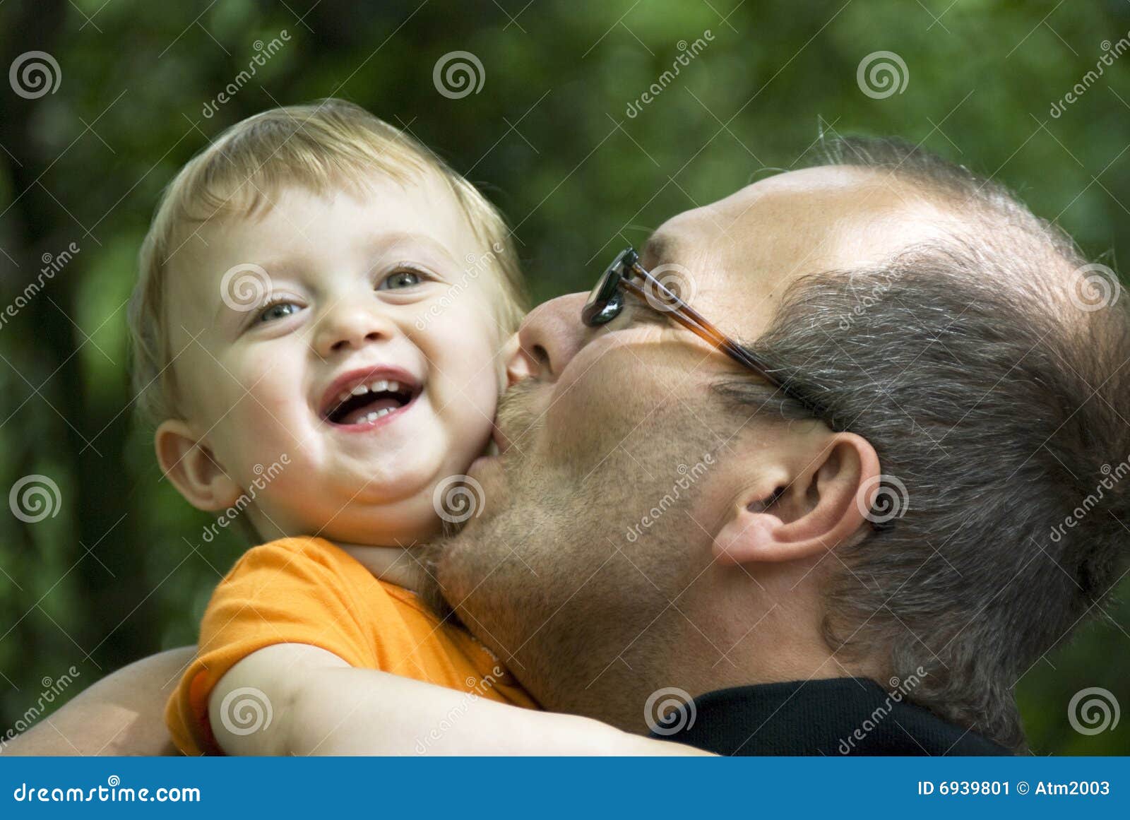 Family kiss stock image. Image of cute, happy, fatherhood - 6939801