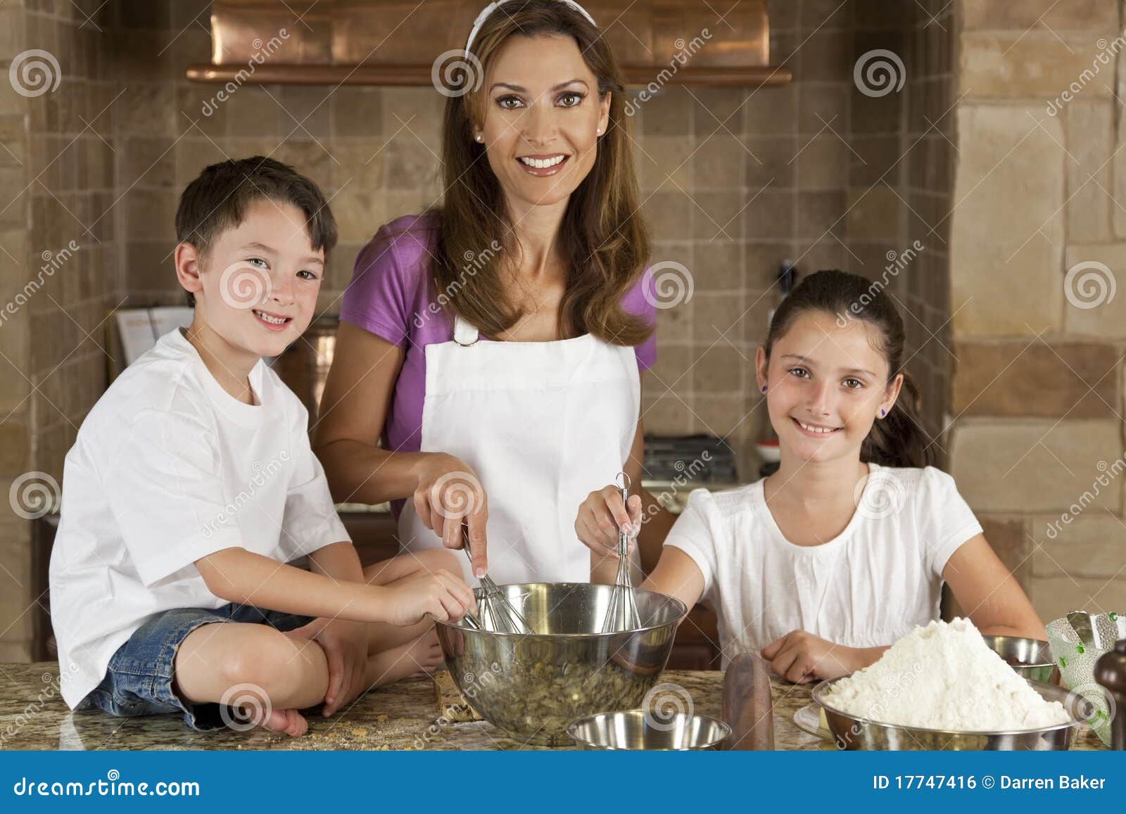 Family in Kitchen Cooking & Baking Stock Photo - Image of four ...