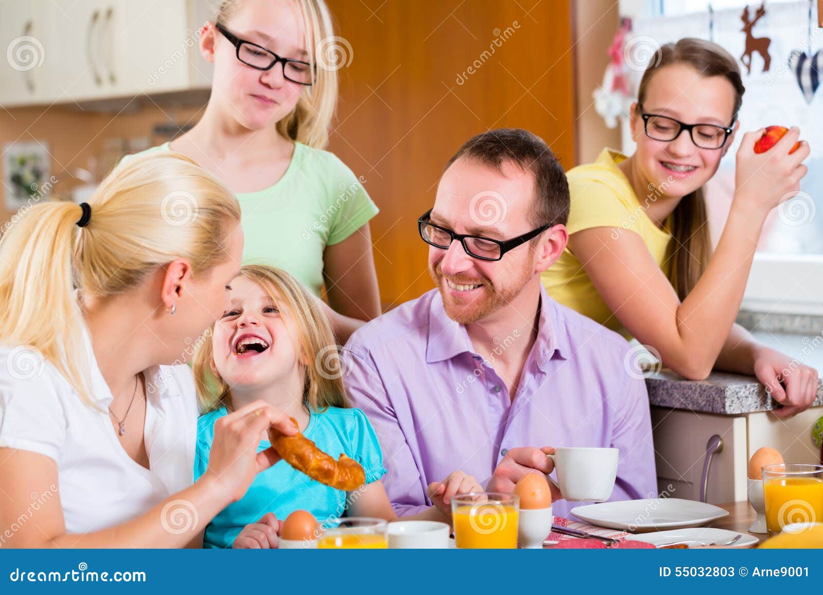 Family in Kitchen Having Breakfast Together Stock Image - Image of food ...