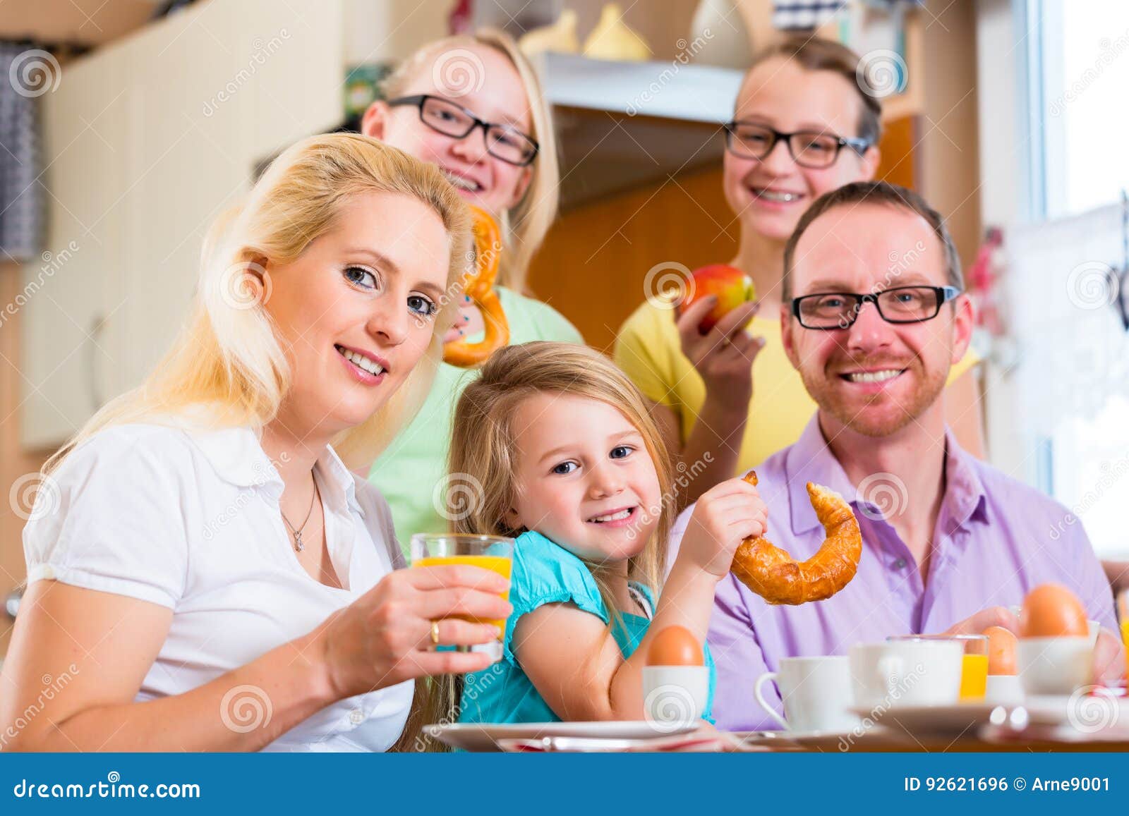 Family in Kitchen Having Breakfast Together Stock Photo - Image of ...