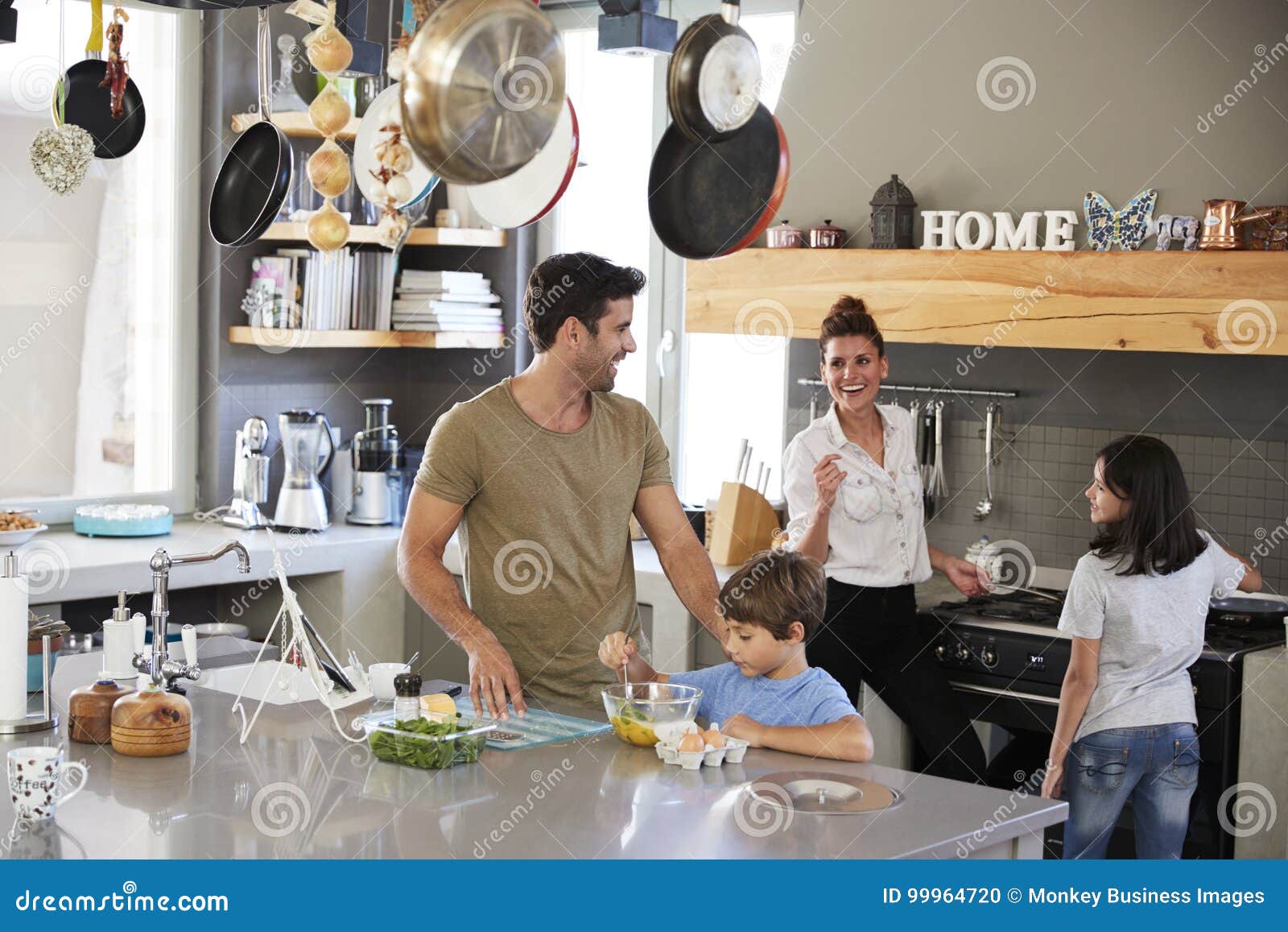 Family in Kitchen Making Morning Breakfast Together Stock Photo - Image ...