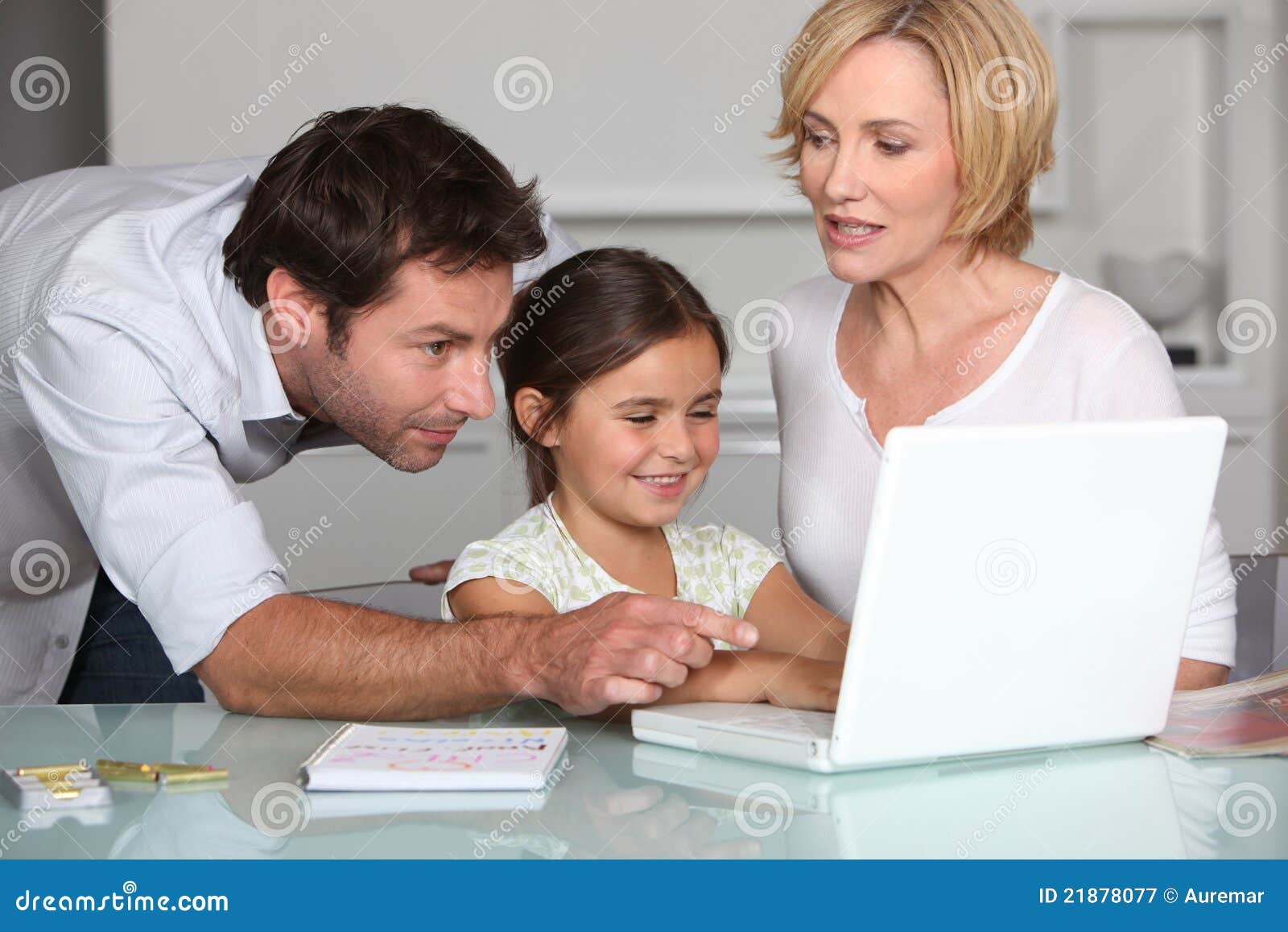 Family on laptop stock image. Image of sitting, family - 21878077