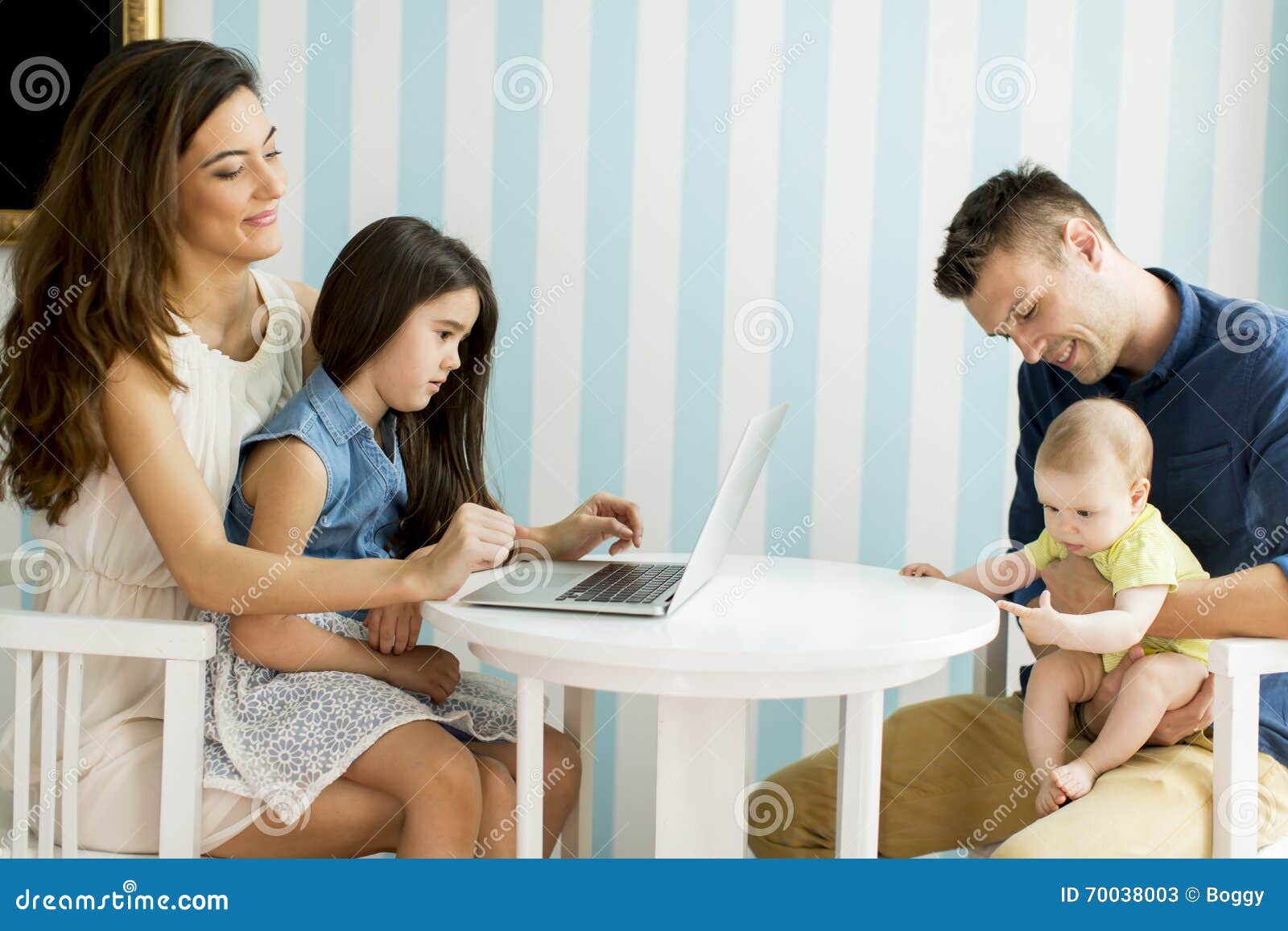 Family with the laptop stock image. Image of sitting - 70038003