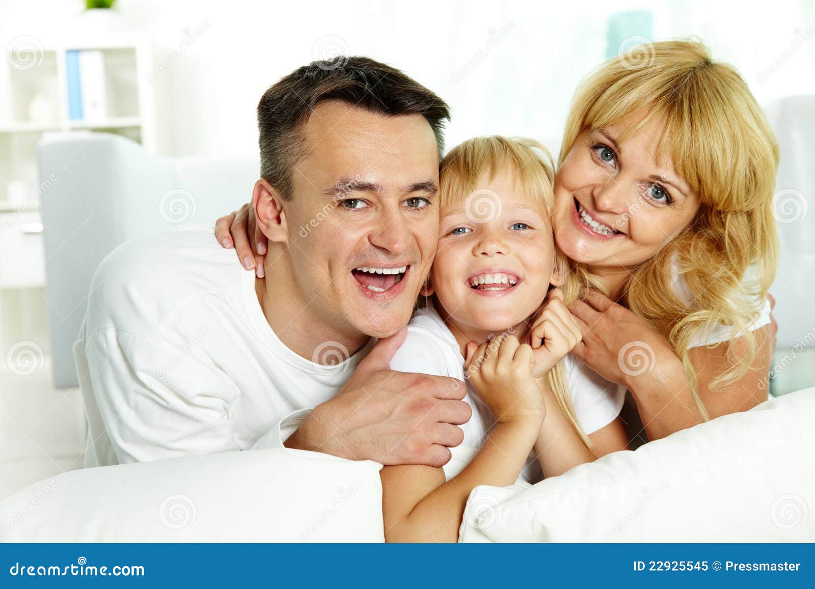 Family laughing stock image. Image of affection, home - 22925545