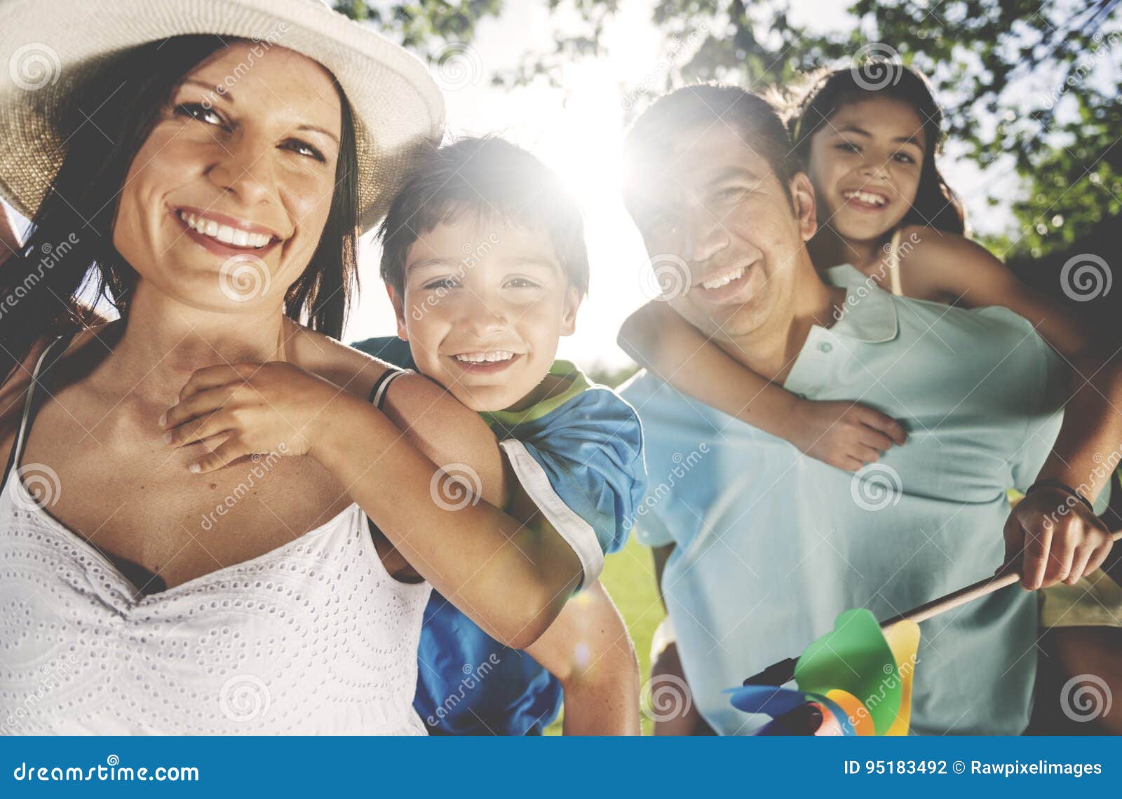 Family Leisure Activity. Smiling Mom Holding Playful Son. Parents ...