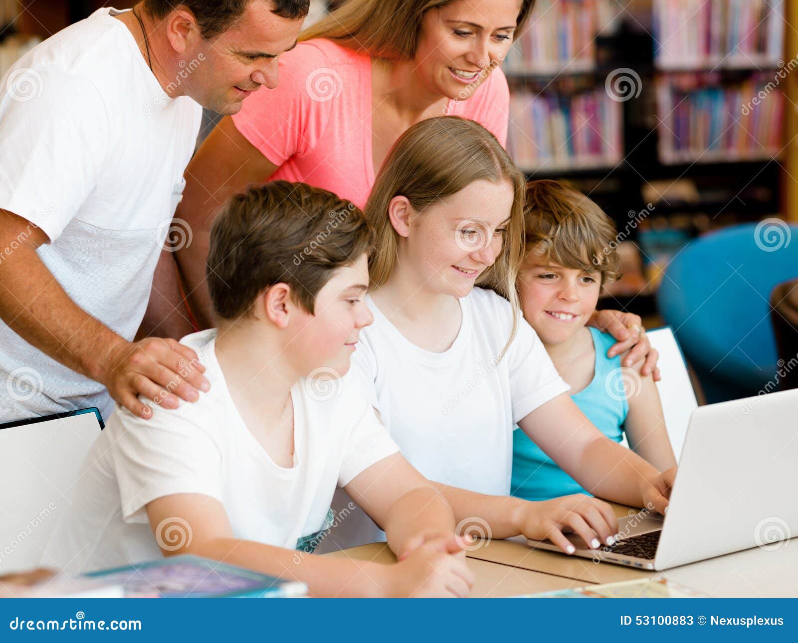 Family in library stock image. Image of kids, education - 53100883