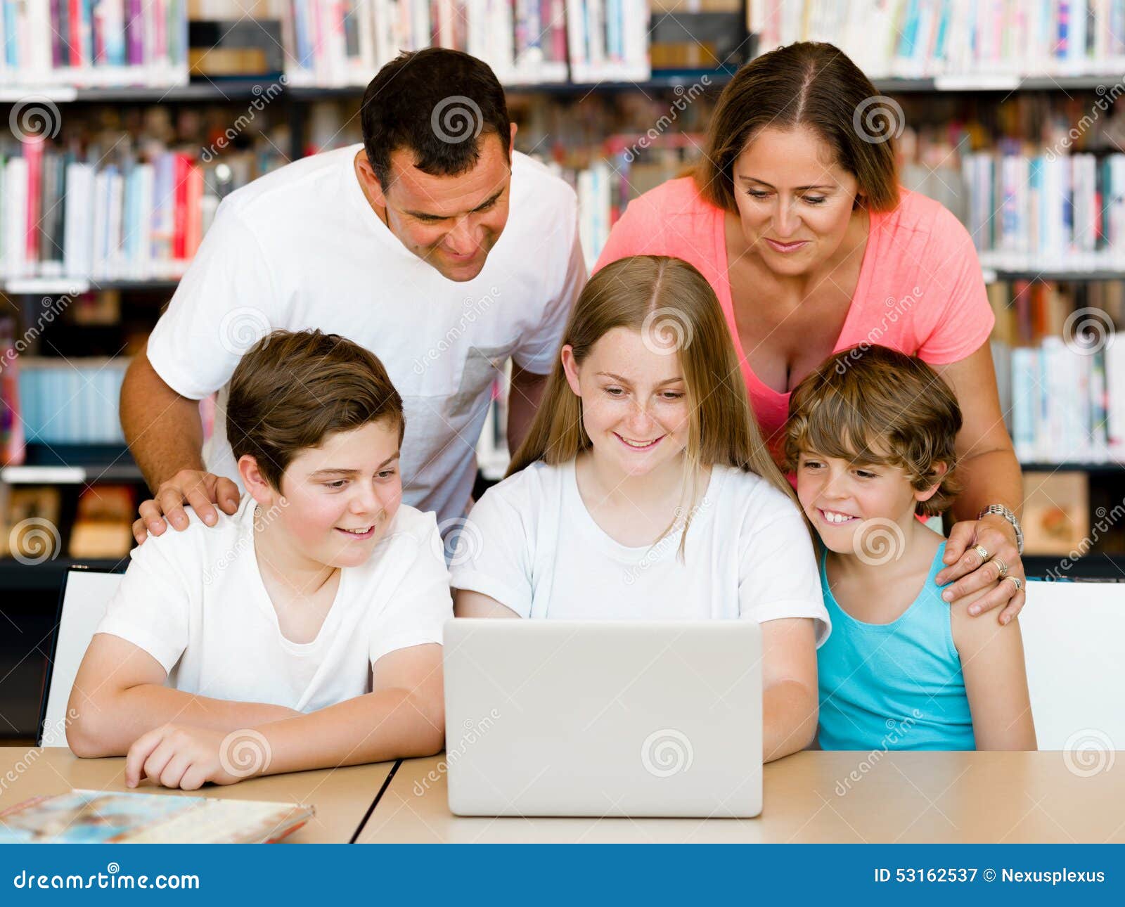 Family in library stock image. Image of girl, person - 53162537