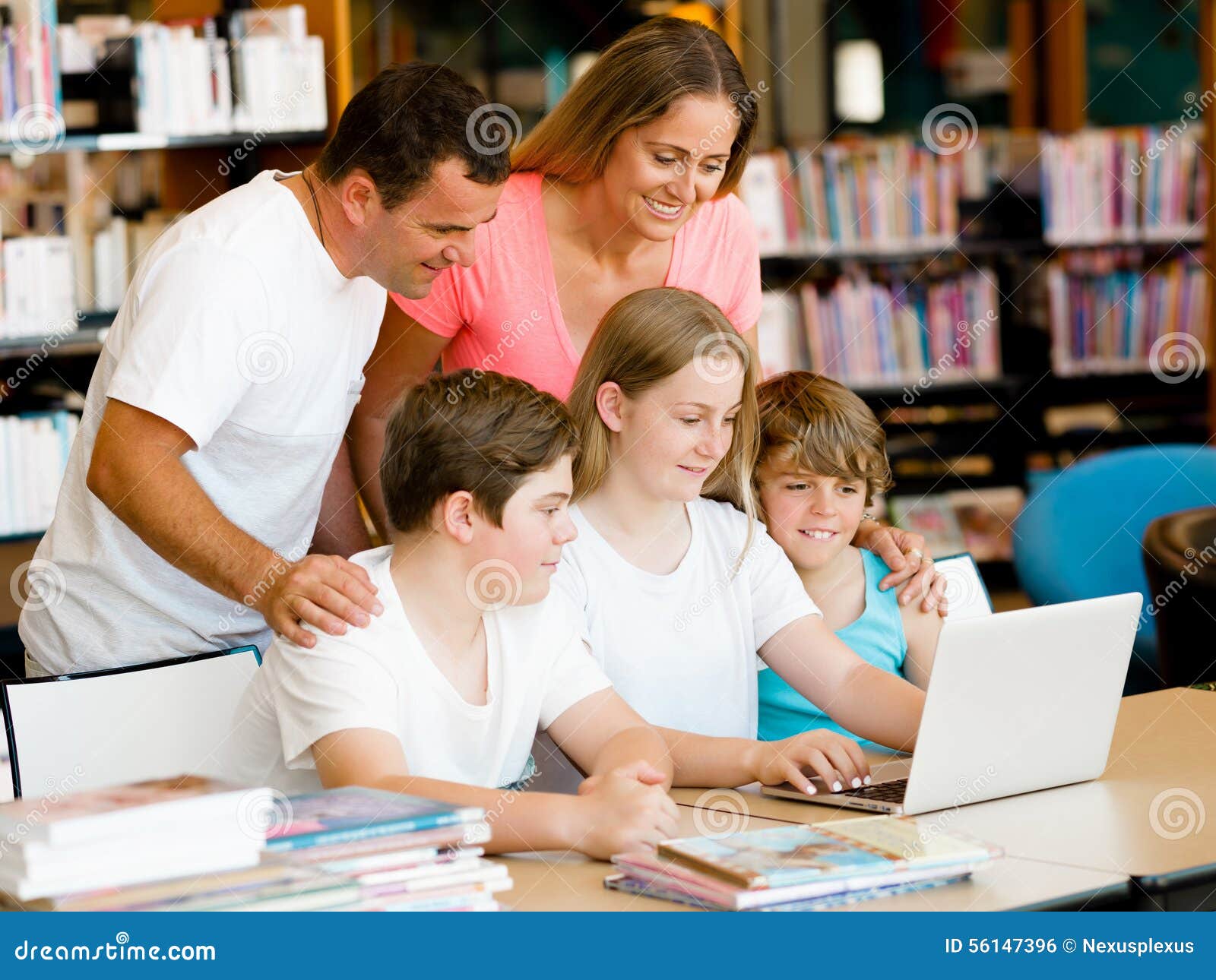 Family in library stock photo. Image of happy, portrait - 56147396