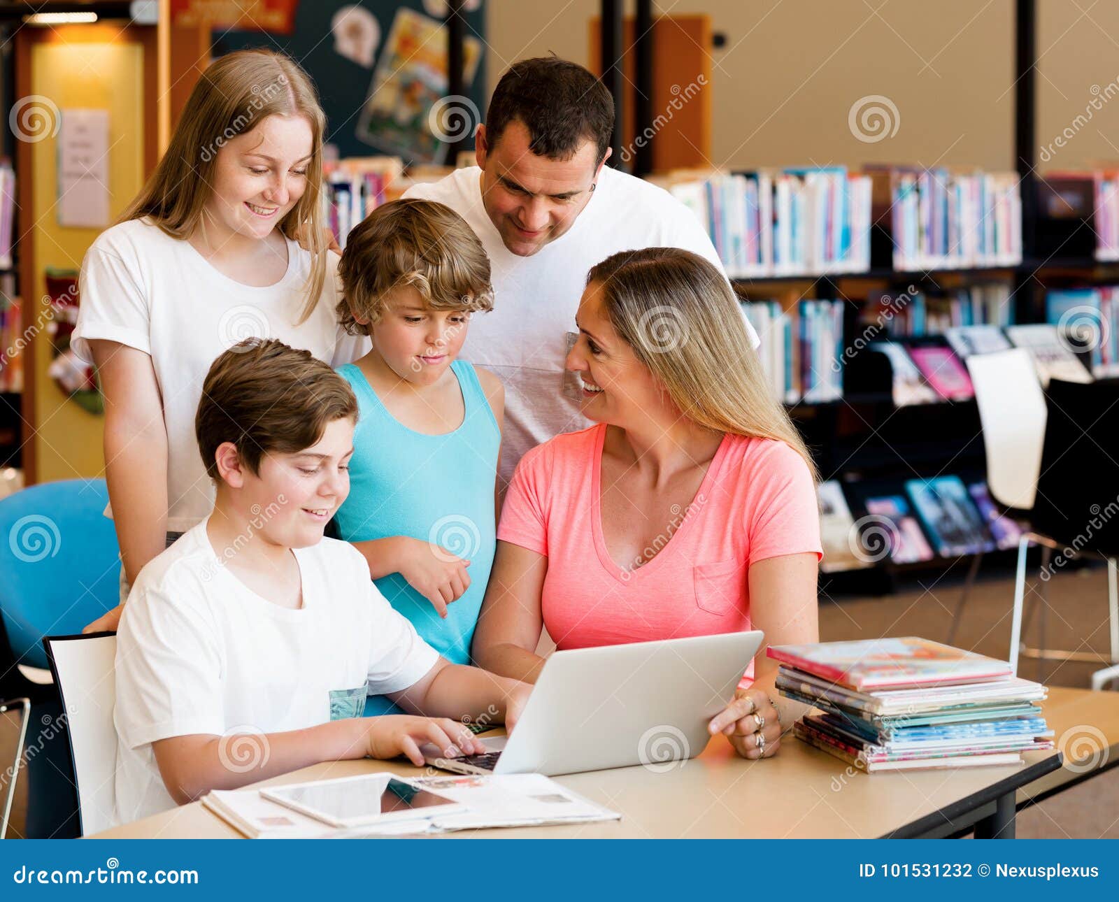 Family in library stock photo. Image of people, male - 101531232