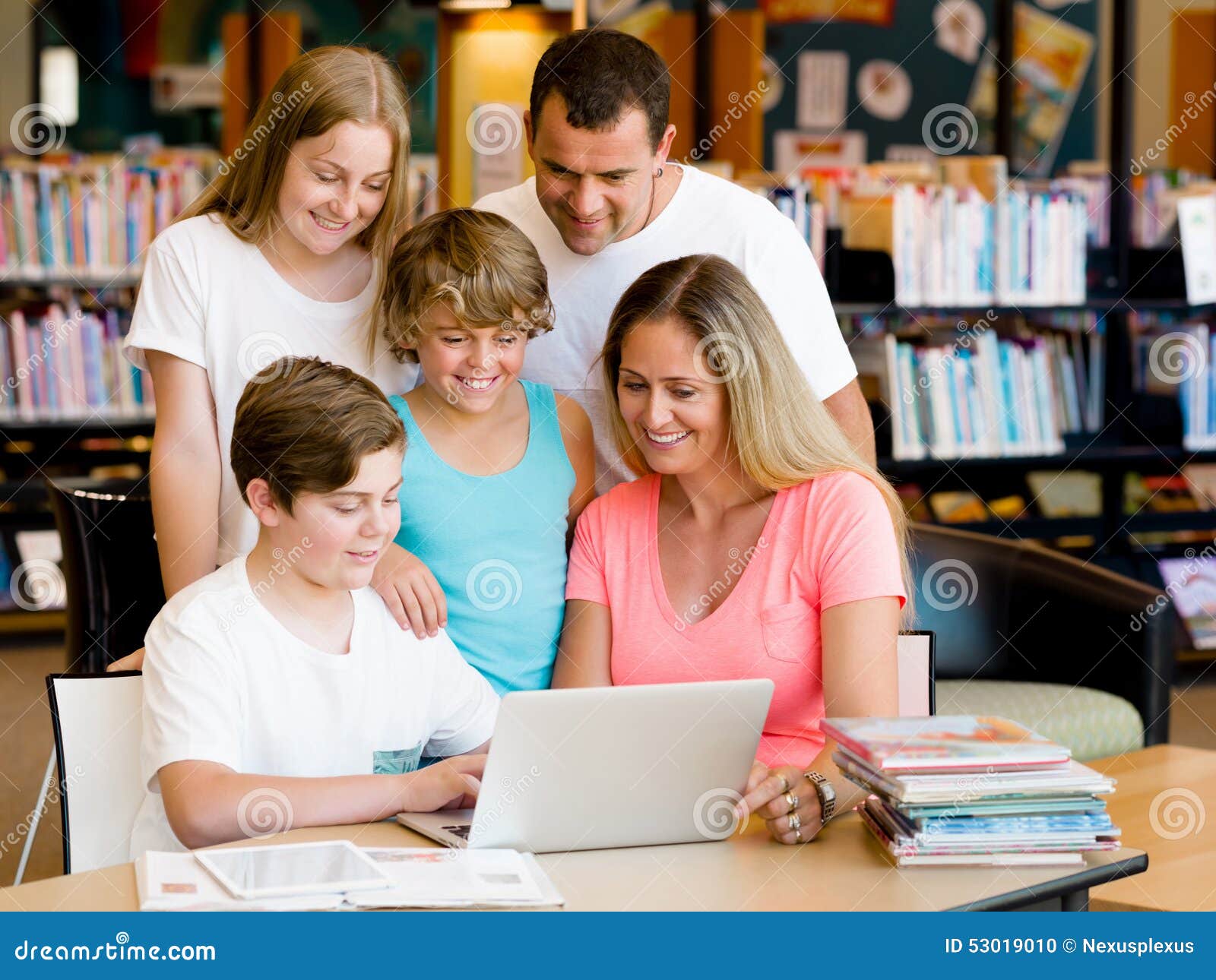 Family in library stock photo. Image of family, internet - 53019010