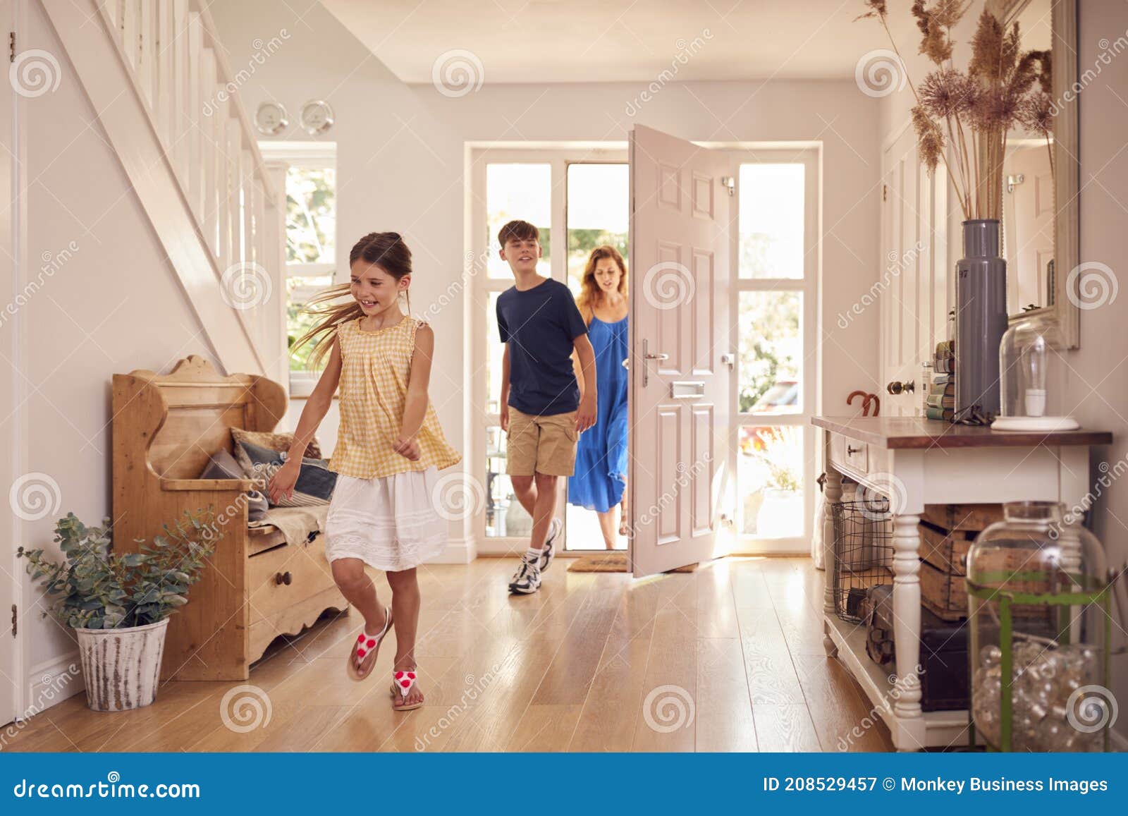 Family Looking Around New Home before they Move in Stock Image - Image ...