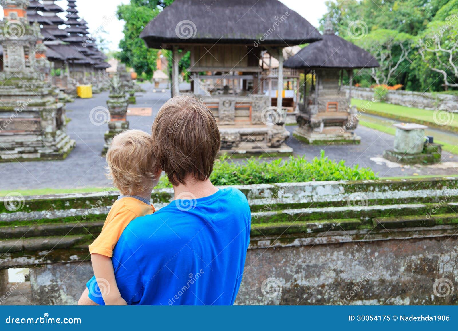 Family Looking at Bali Temples Stock Image - Image of father, baby ...