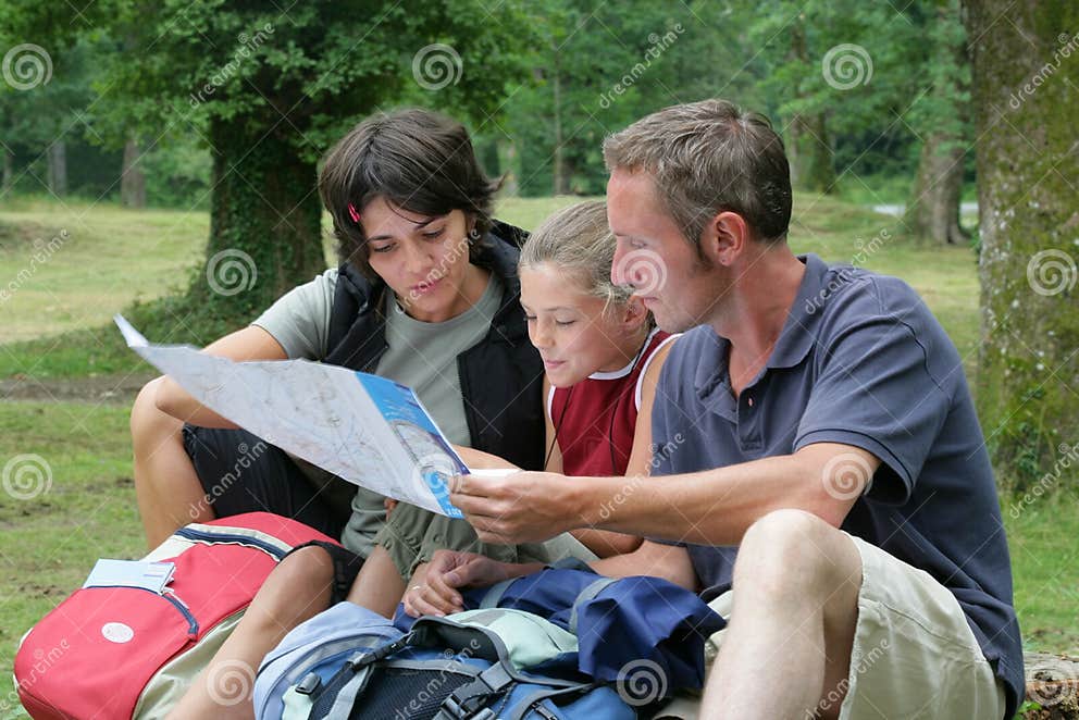 Family Looking at Hiking Map Stock Photo - Image of front, loving: 8977904