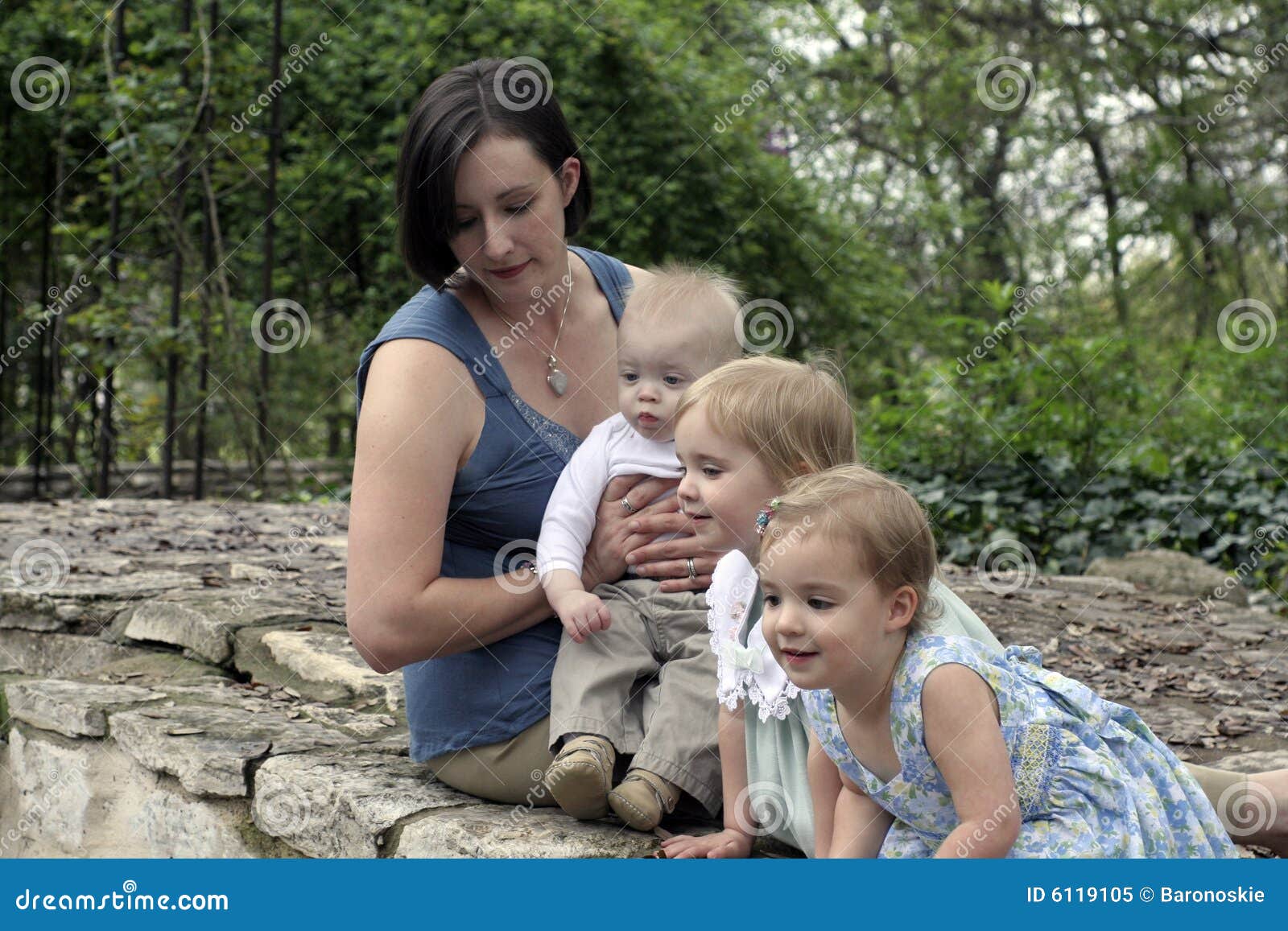 Family Looking Over Bridge stock image. Image of child - 6119105