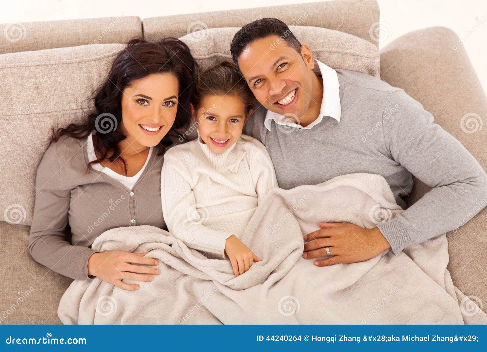 Family lying couch stock photo. Image of indoors, cozy - 44240264