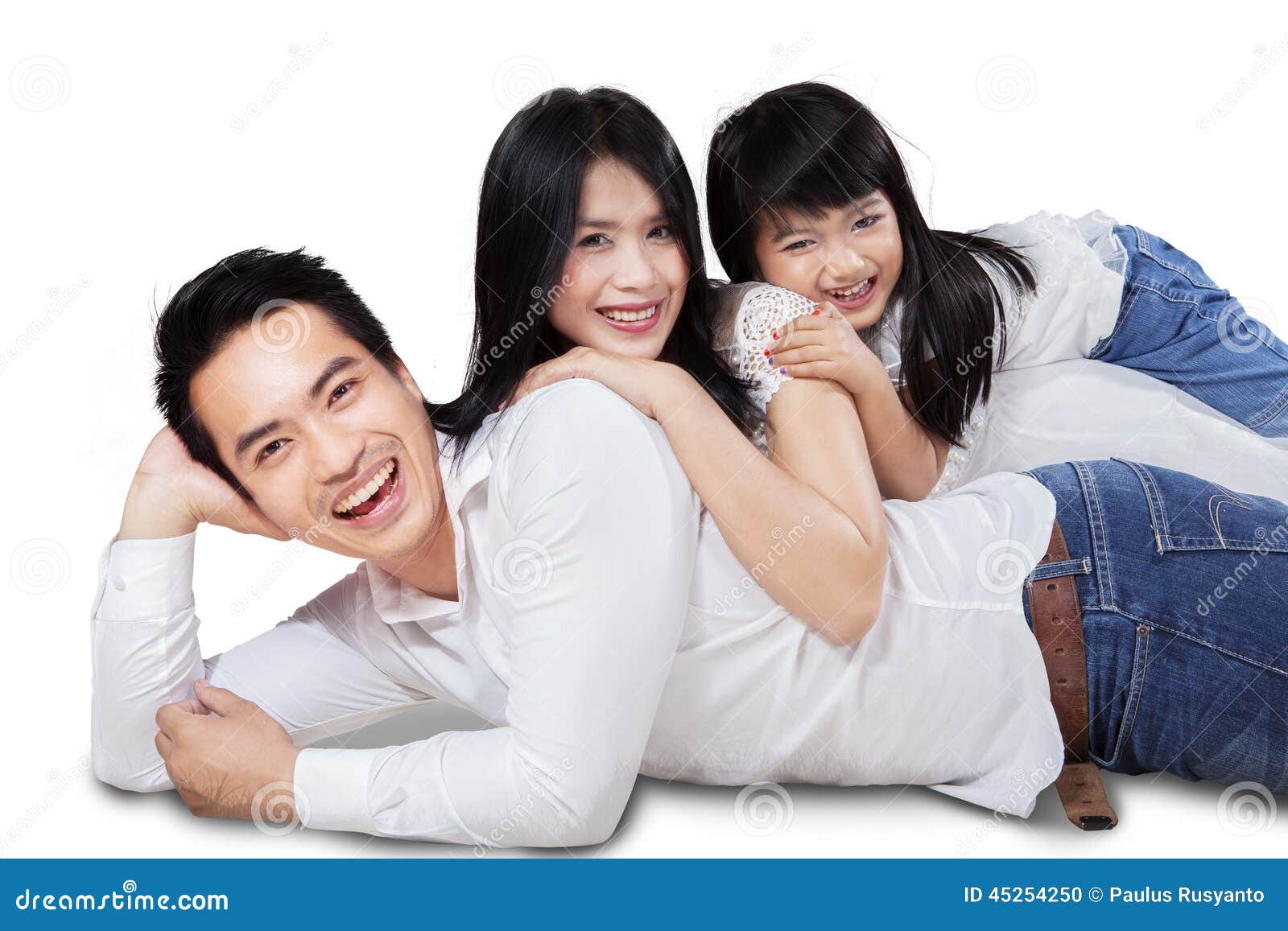 Family Lying and Cuddling in Studio Stock Photo - Image of happy ...