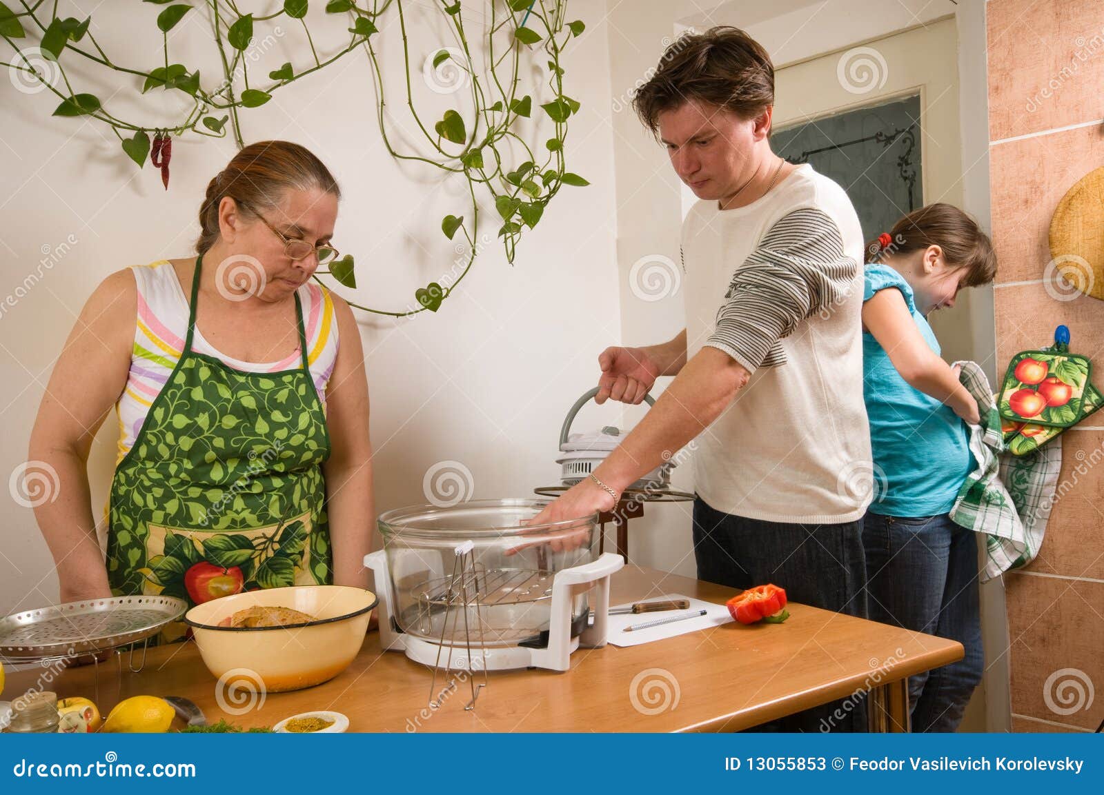 The family makes a supper. stock image. Image of direct - 13055853