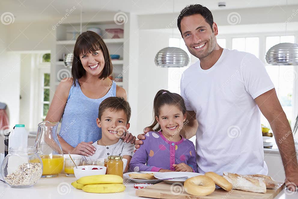 Family Making Breakfast in Kitchen Together Stock Image - Image of ...