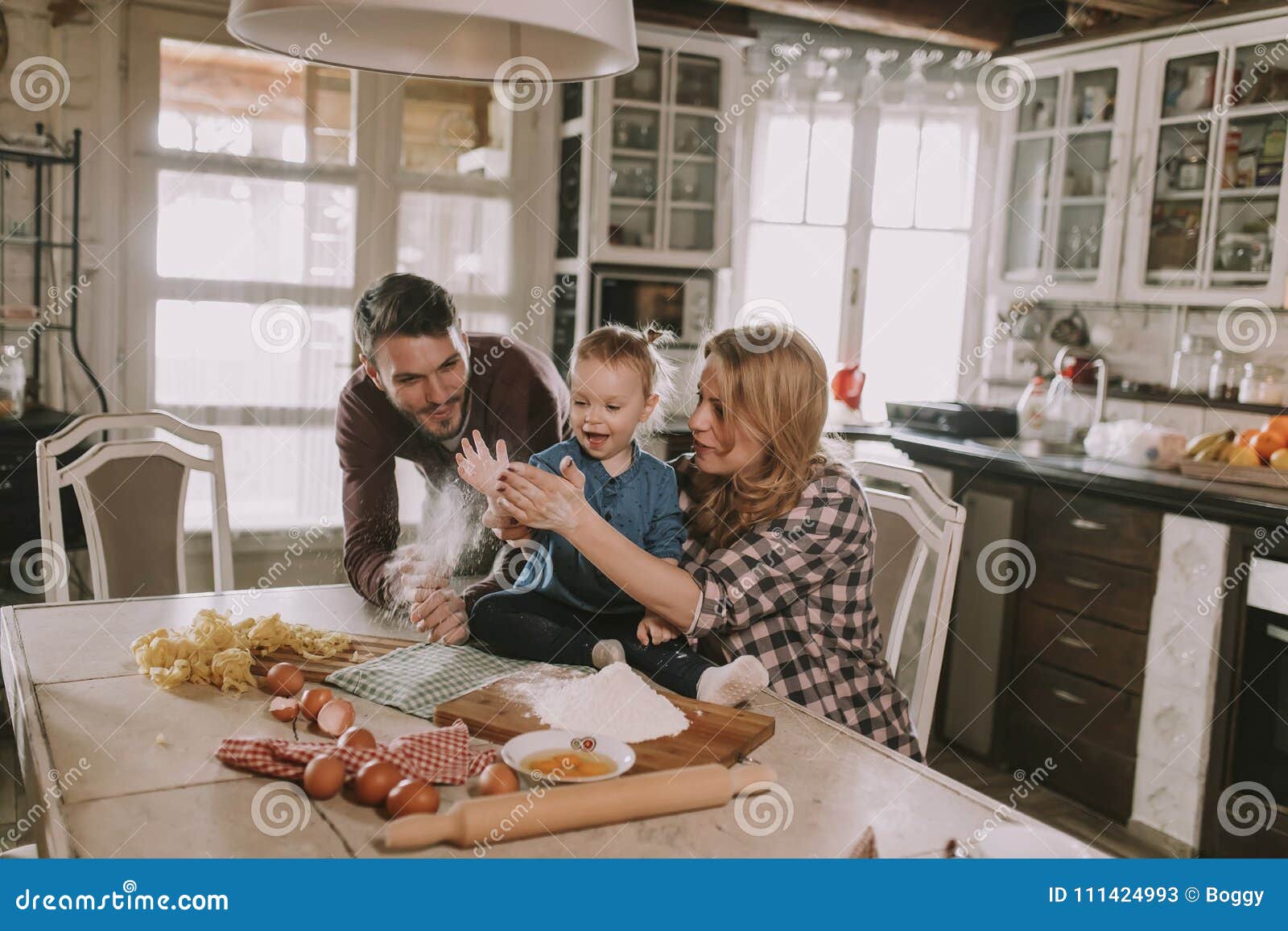Family Making Pasta in the Kitchen at Home Stock Image - Image of ...