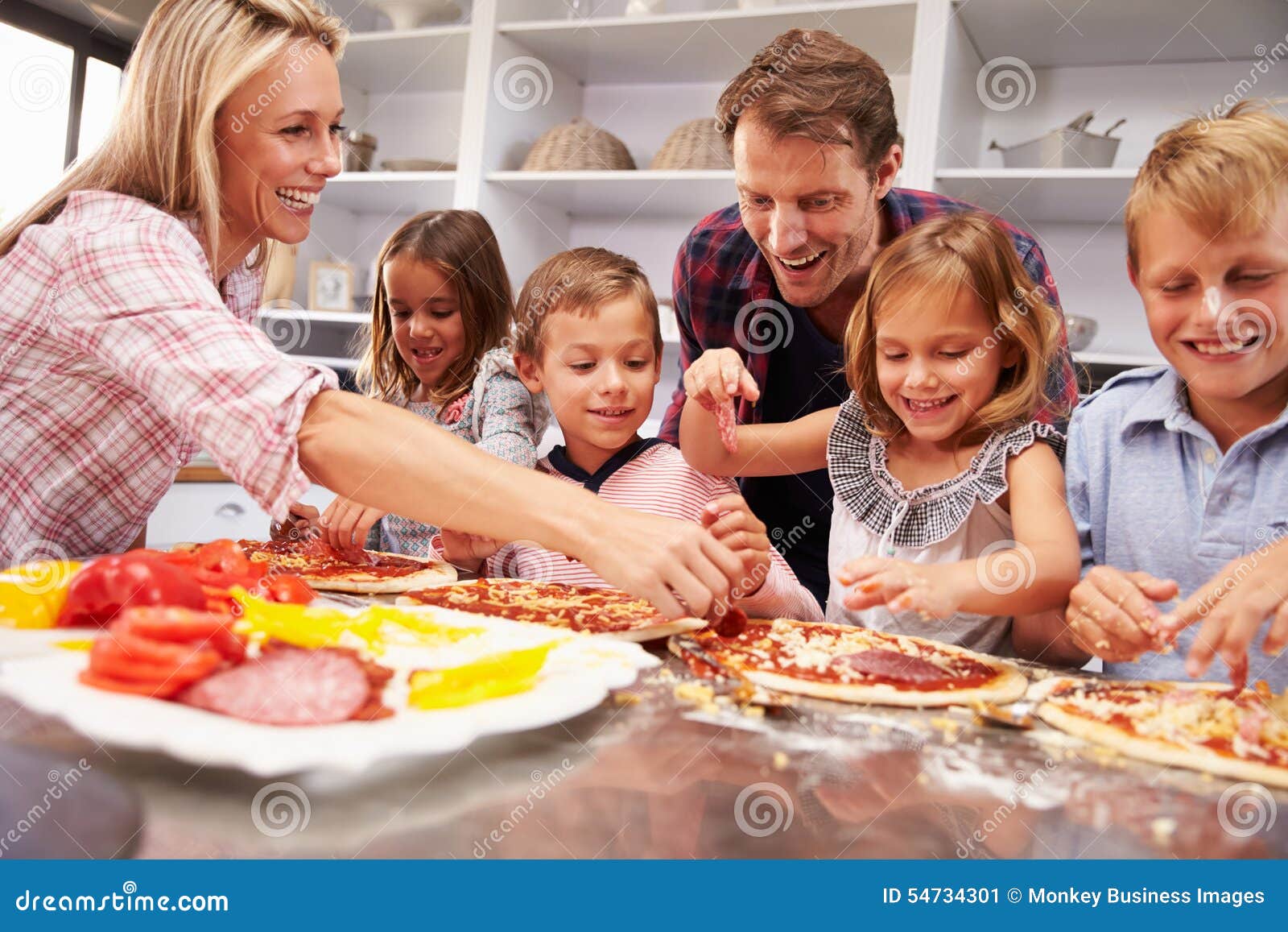 Family Making Pizza for Dinner Stock Image - Image of guidance, boys ...
