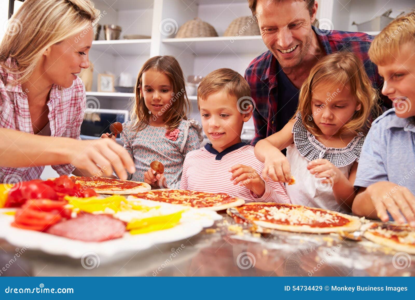 Family Making Pizza for Dinner Stock Image - Image of food, hobbies ...