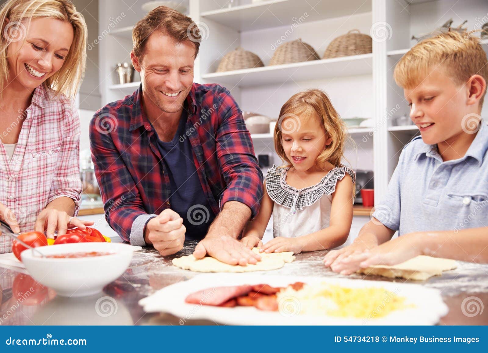 Family Making Pizza Together Stock Photo - Image of cooperation ...