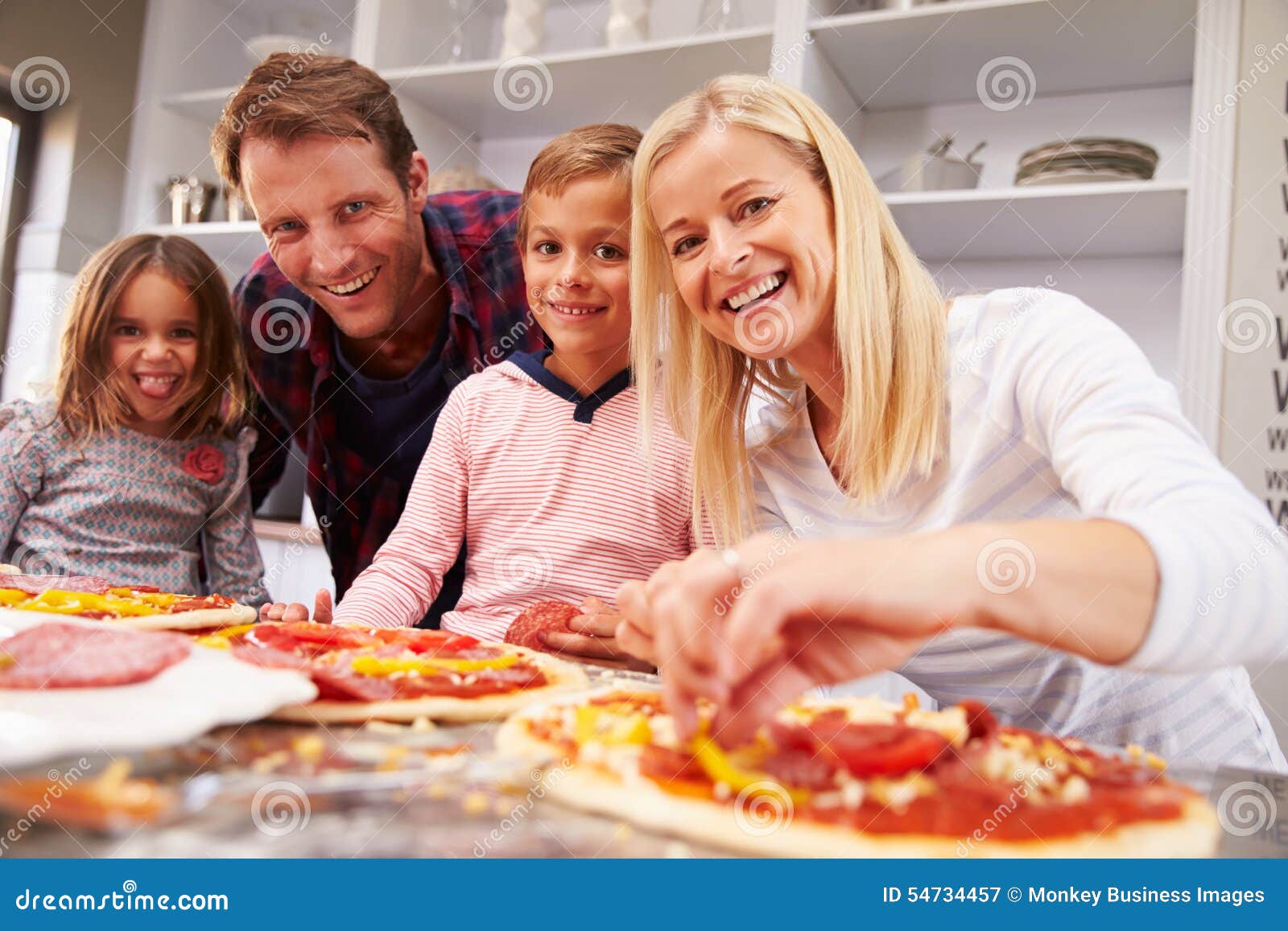 Family Making Pizza Together Stock Image - Image of horizontal, kitchen ...