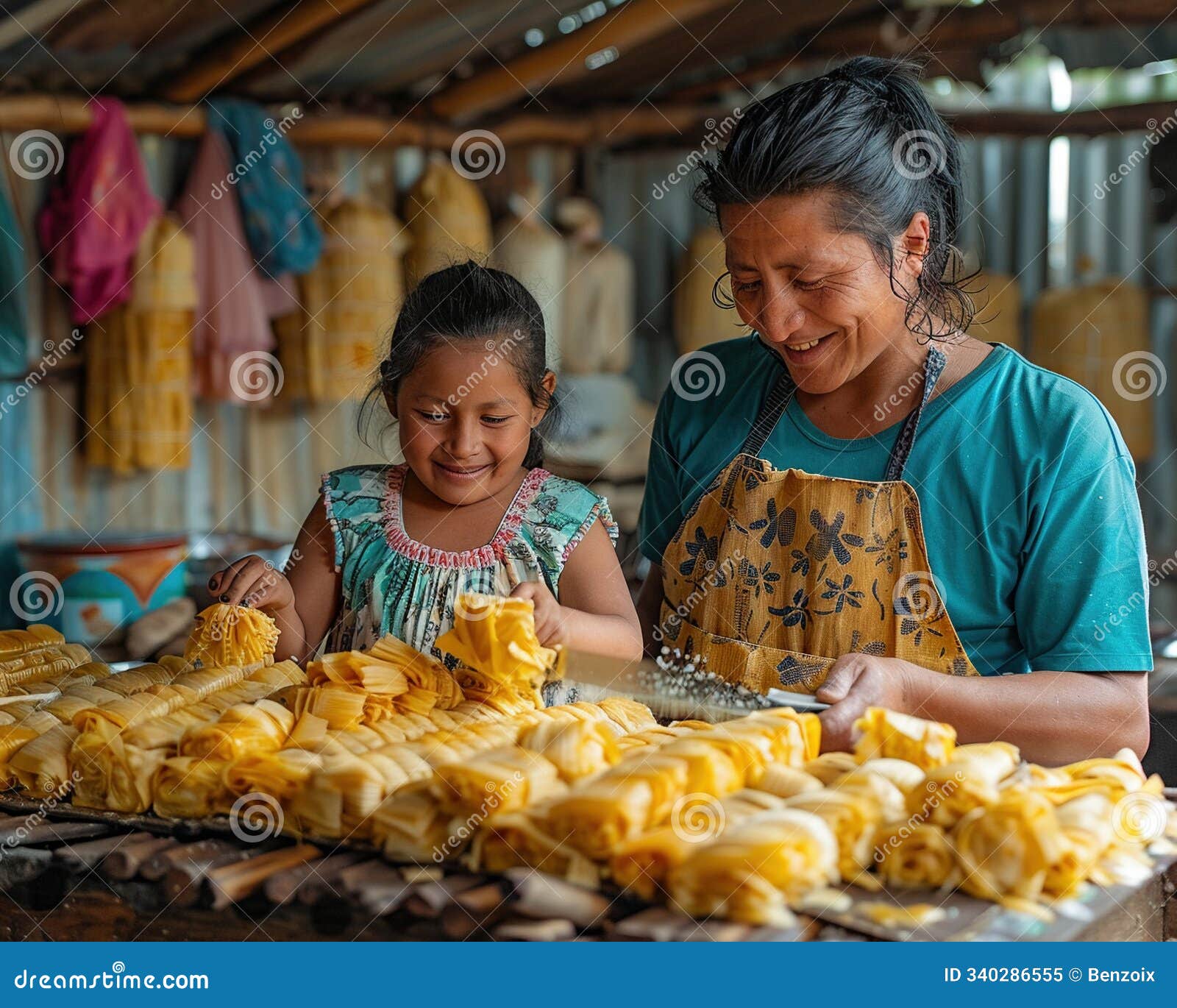 A Family Making Tamales Together in a Kitchen. Stock Image - Image of ...