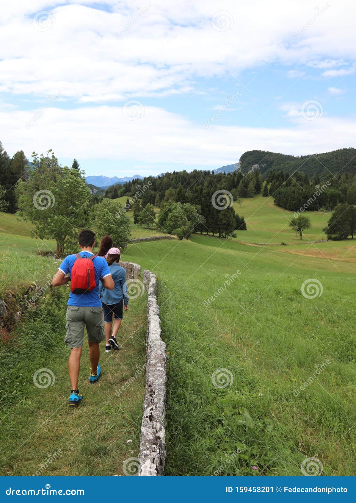 Family on the Mountain Track Stock Image - Image of teens, hike: 159458201