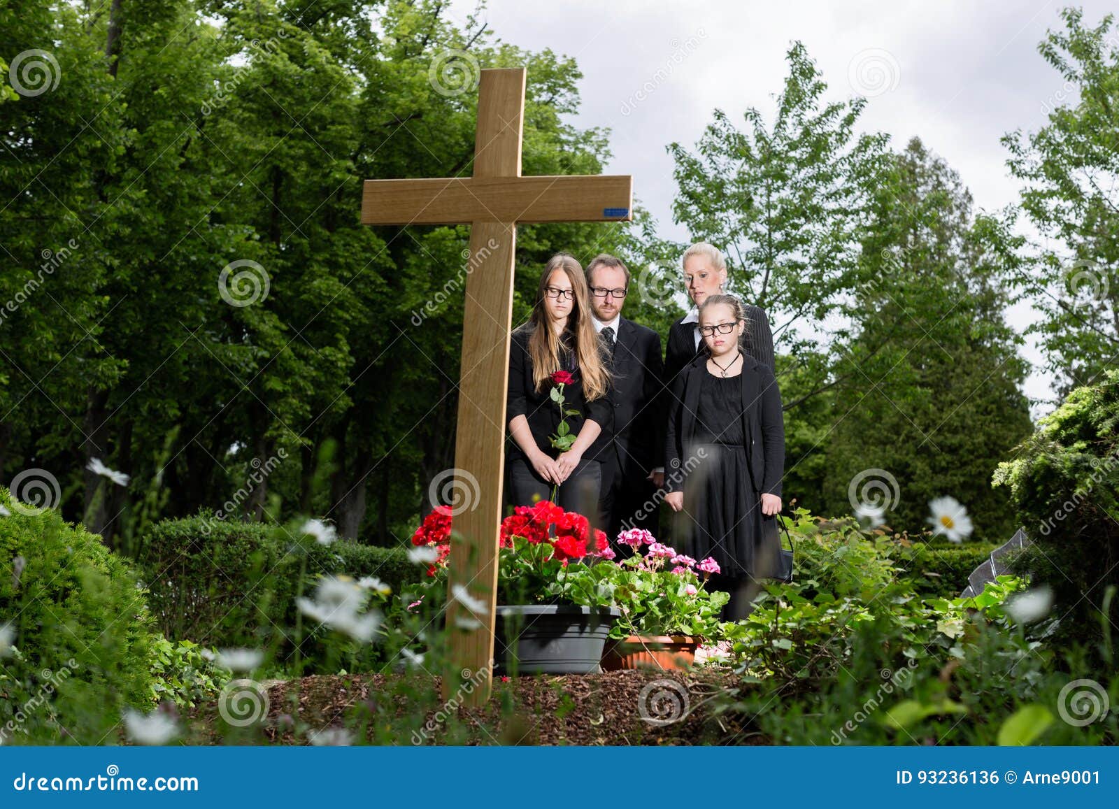 Family Mourning at Grave on Cemetery Stock Photo - Image of goodbye ...