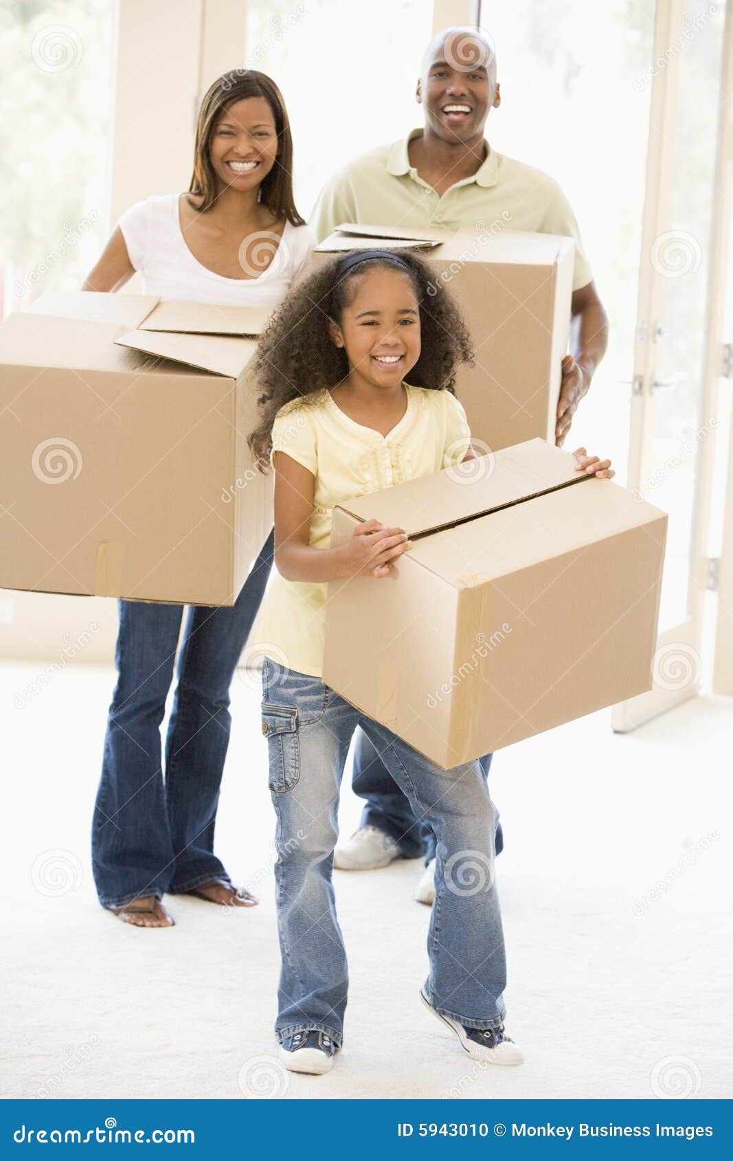 Family Moving into New Home Smiling Stock Photo - Image of full, estate ...