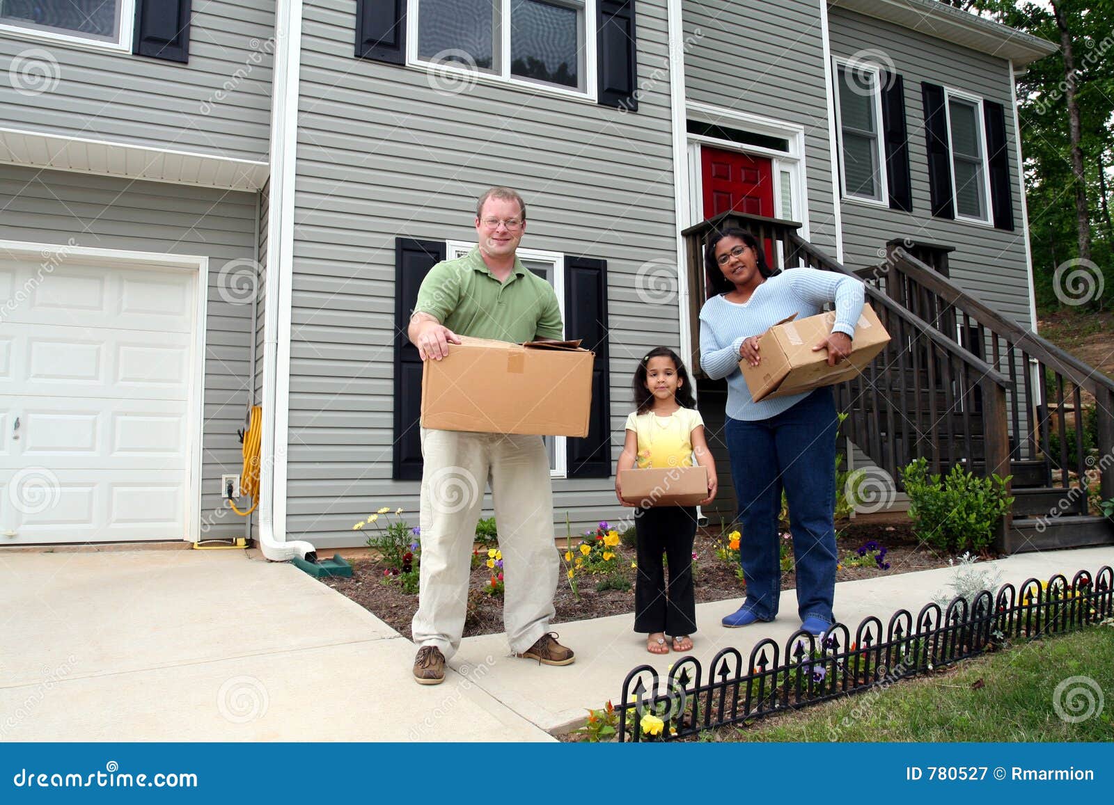 A Family Moving into New House Stock Image - Image of excited, mixed ...