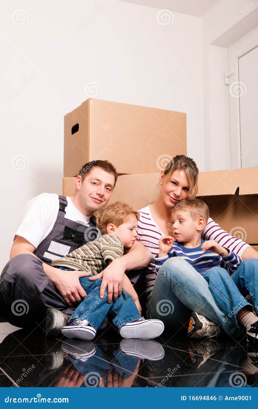Family Moving in Their New Home Stock Photo - Image of caucasian ...