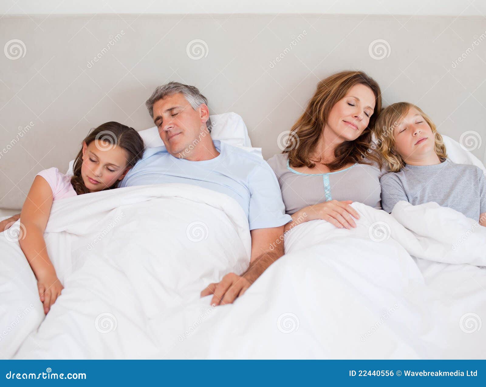 Family napping together stock photo. Image of love, caucasian - 22440556