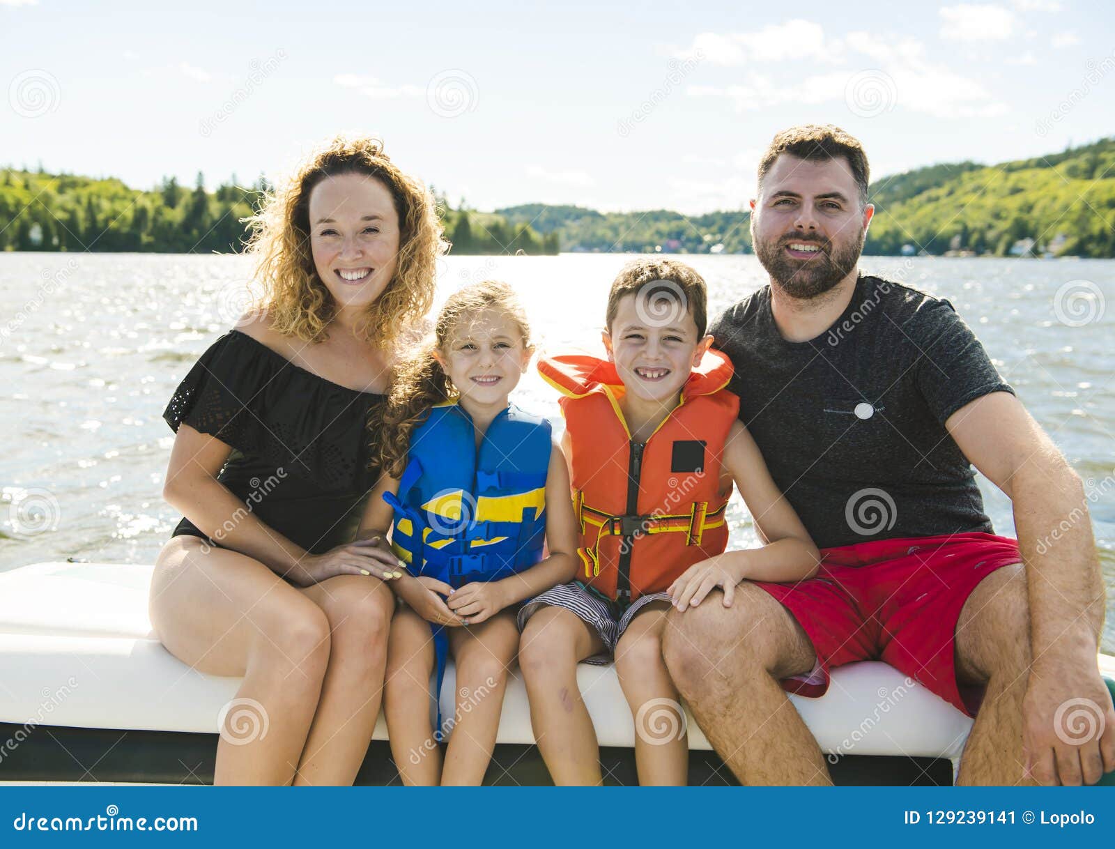 Family Out Boating Together Having Fun on Vacancy Stock Image - Image ...