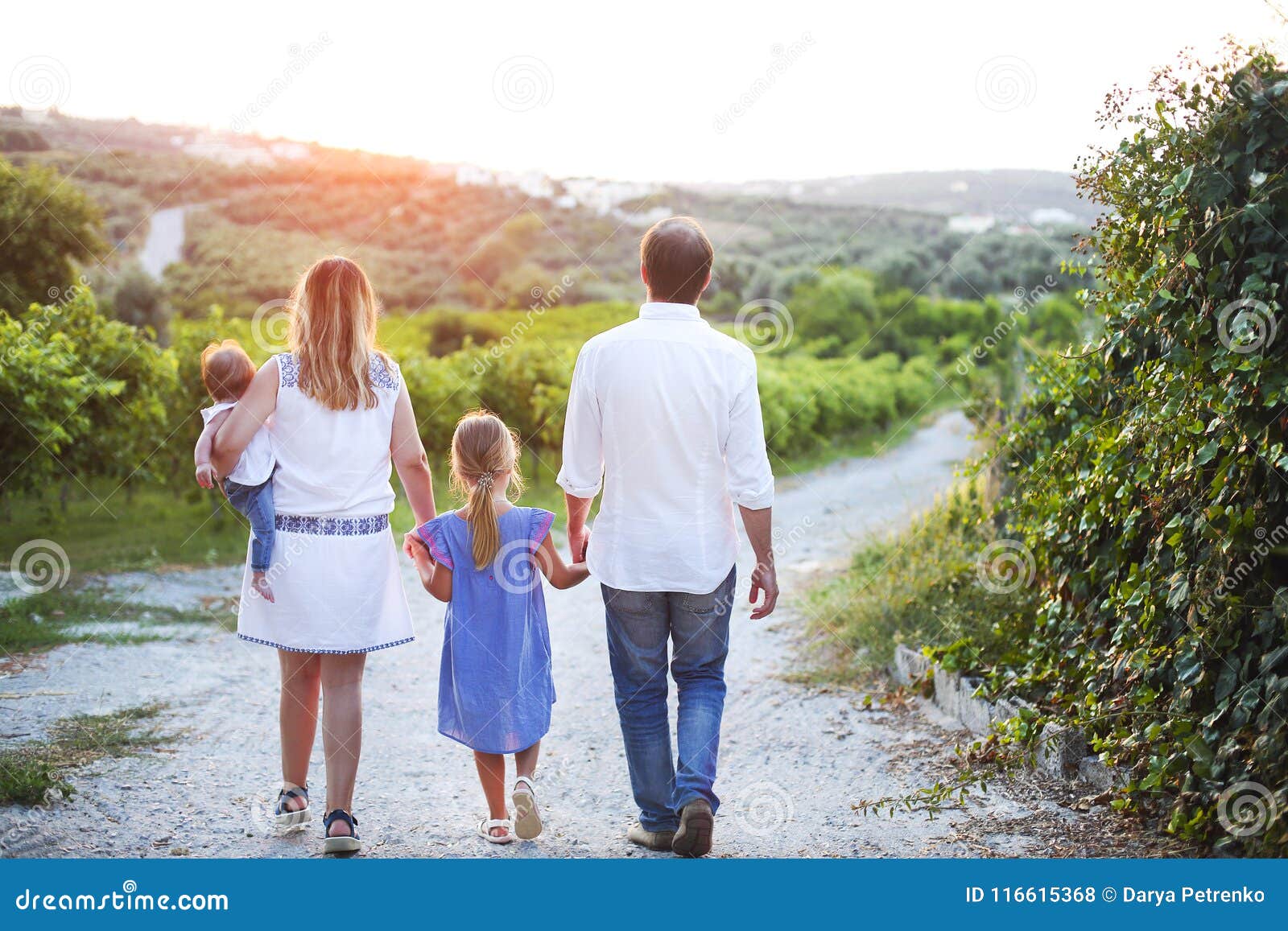 Family outdoors back view stock photo. Image of baby - 116615368
