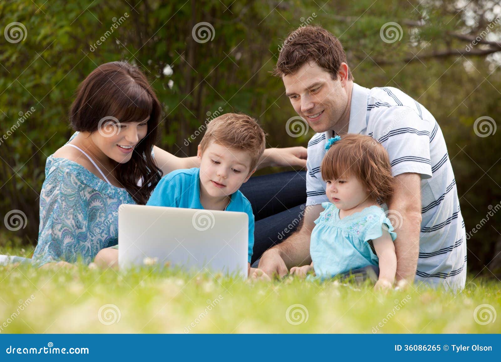 Family Outdoors with Computer Stock Image - Image of adult, casual ...