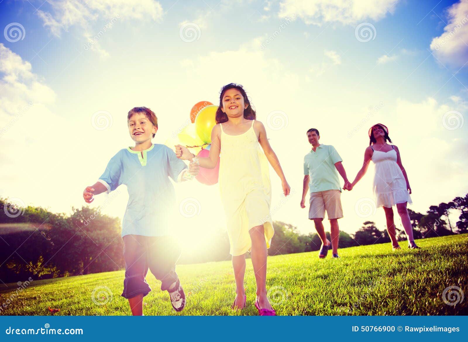 Family Outdoors Walking Toward Camera Leisure Concept Stock Photo ...