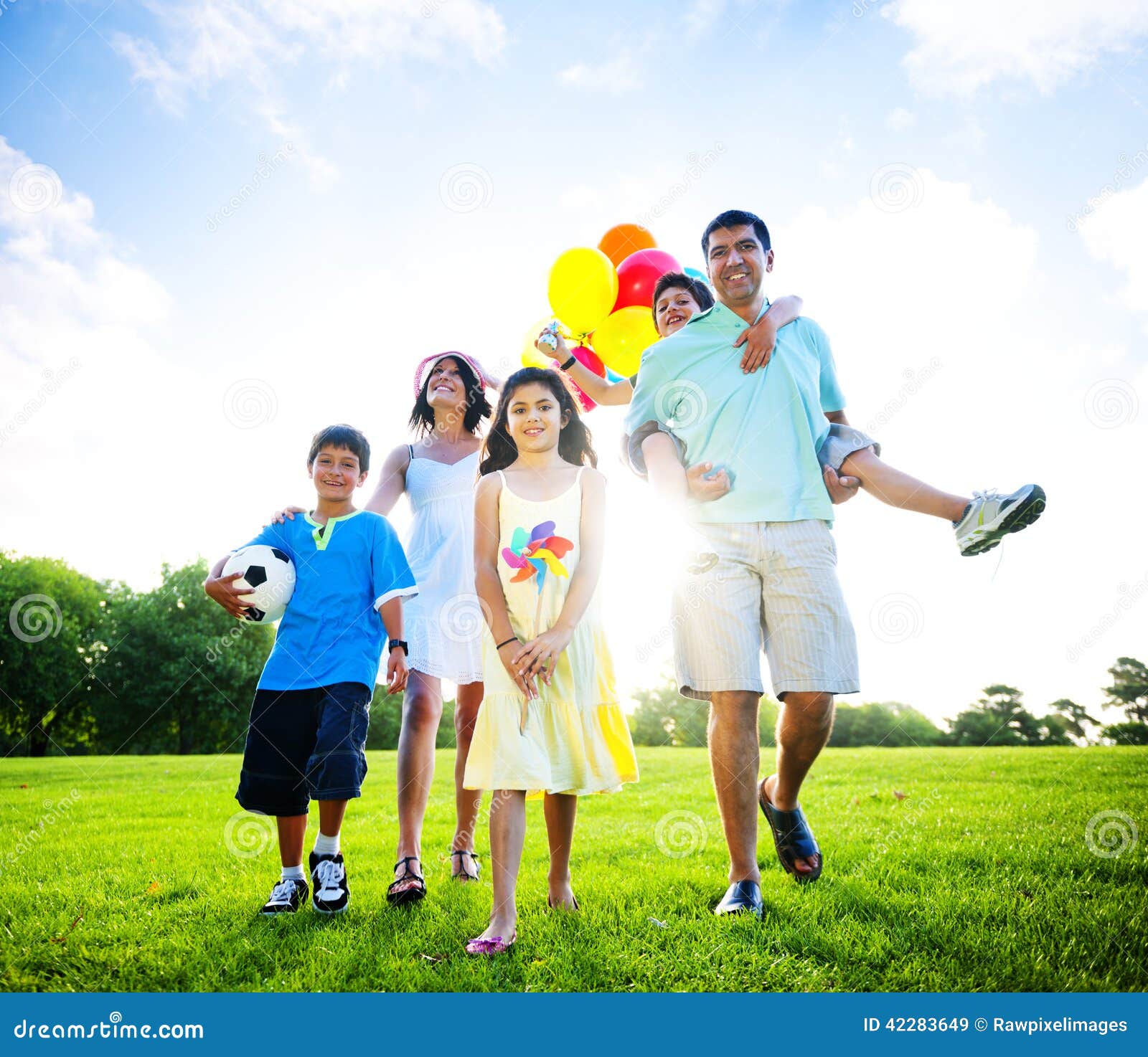 Family in Outdoors Walking Towards a Camera Stock Image - Image of ...