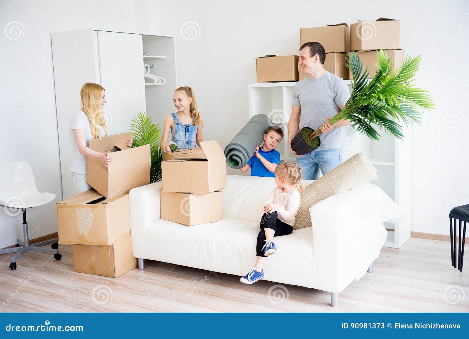 Family Packing Cardboard Boxes Stock Image - Image of cute, home: 90981373