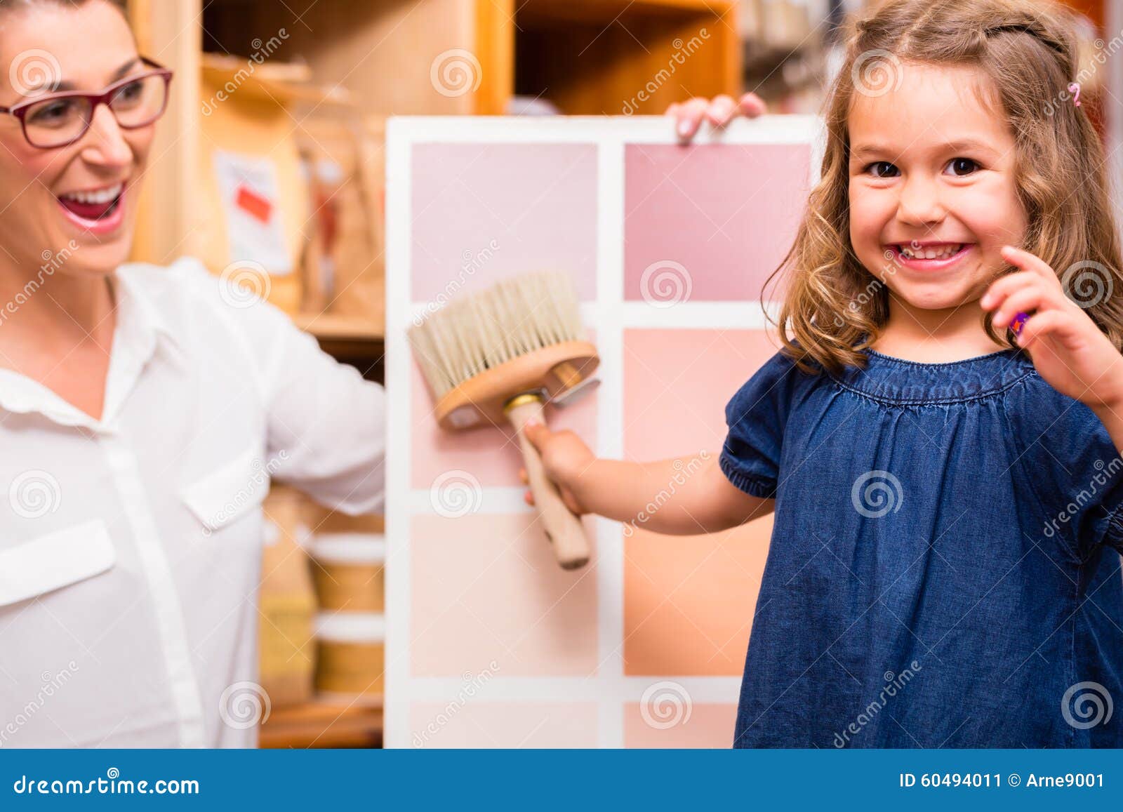 Family with Paint Sample Card in Store Stock Image - Image of store ...