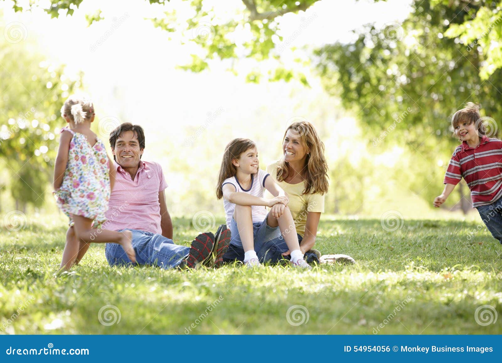 Family in park stock photo. Image of outside, forties - 54954056