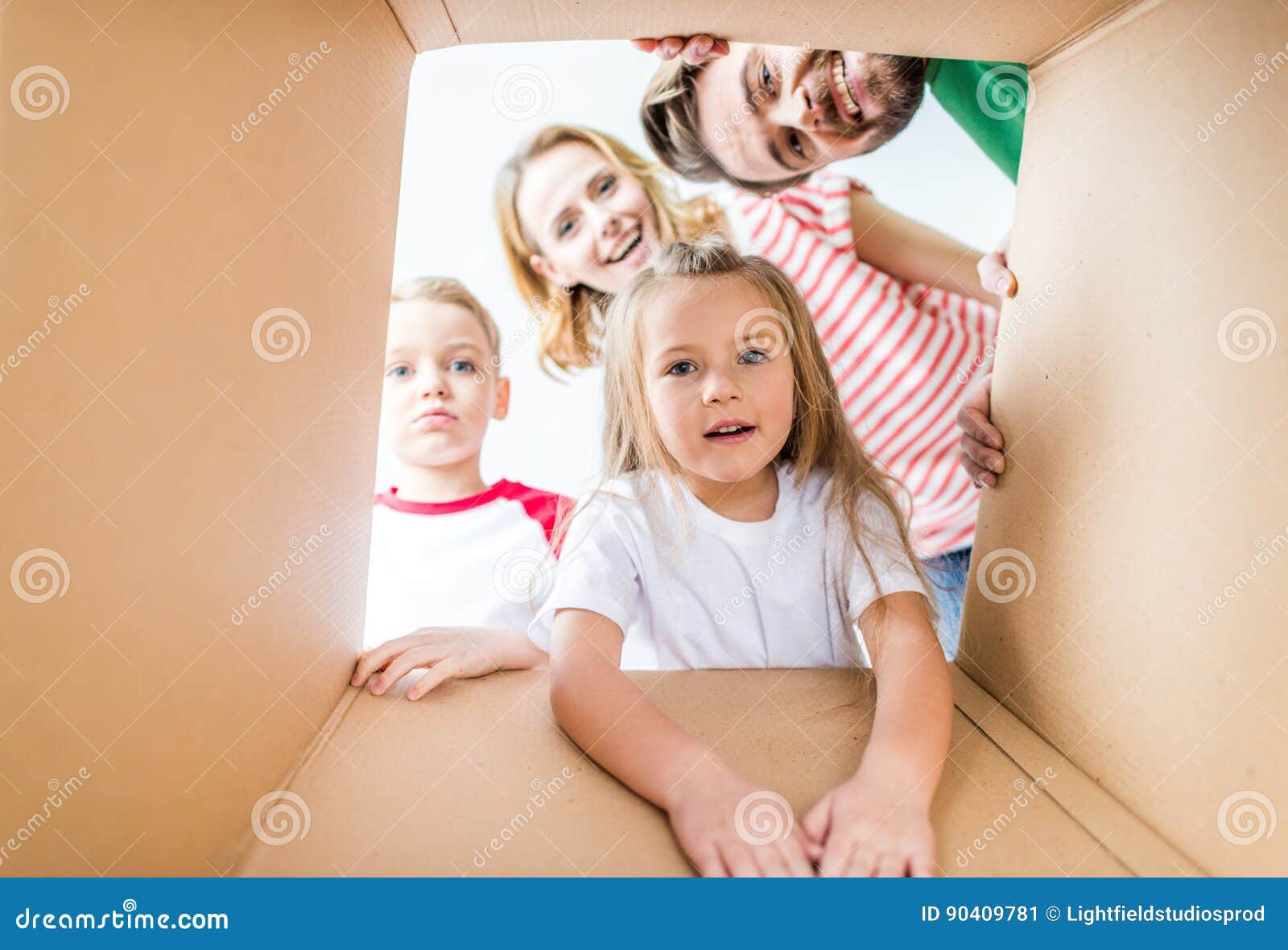 Family Peeking from Cardboard Box Stock Image - Image of mommy ...